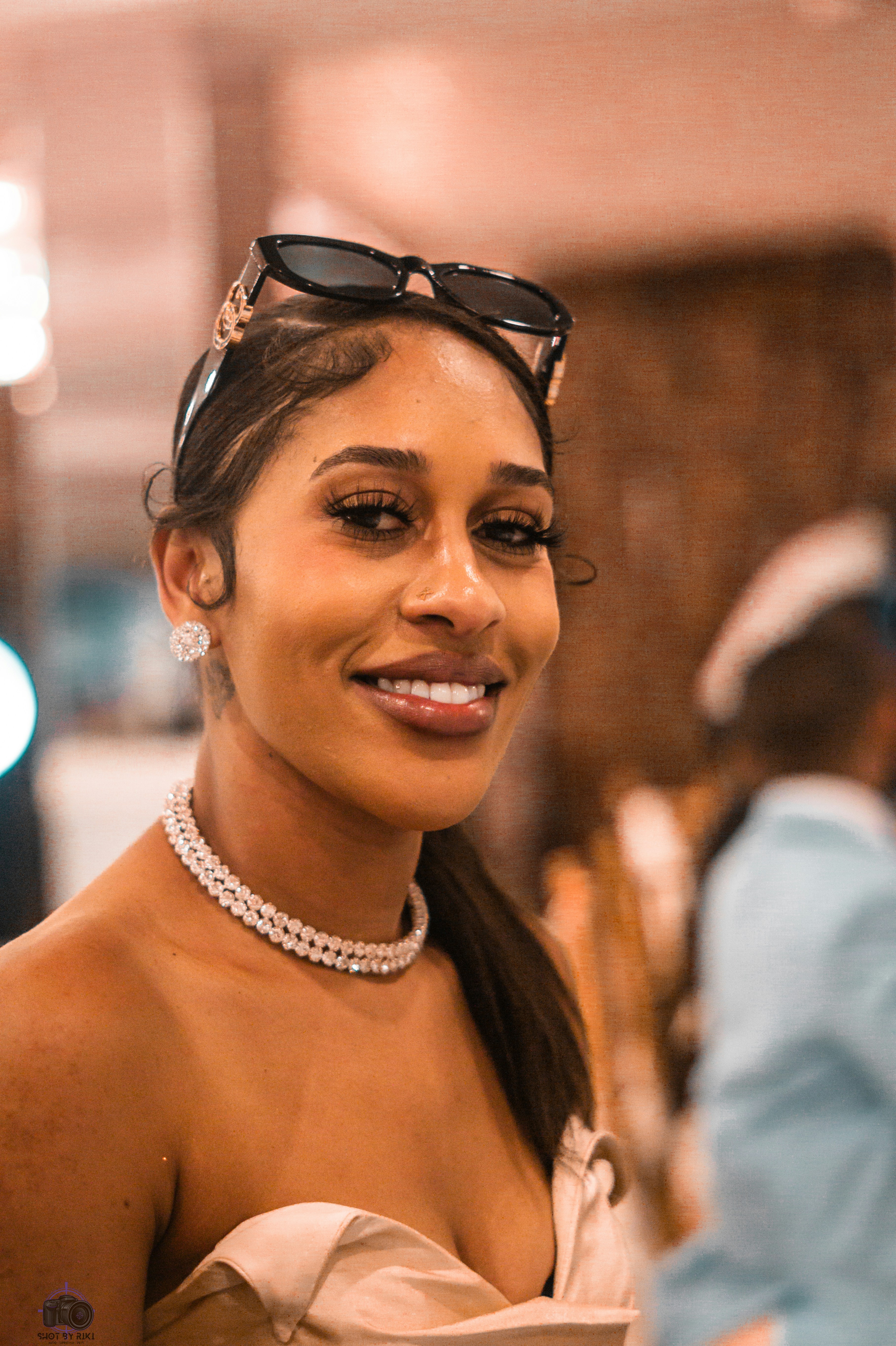 Elegant Smile Under Soft Lighting