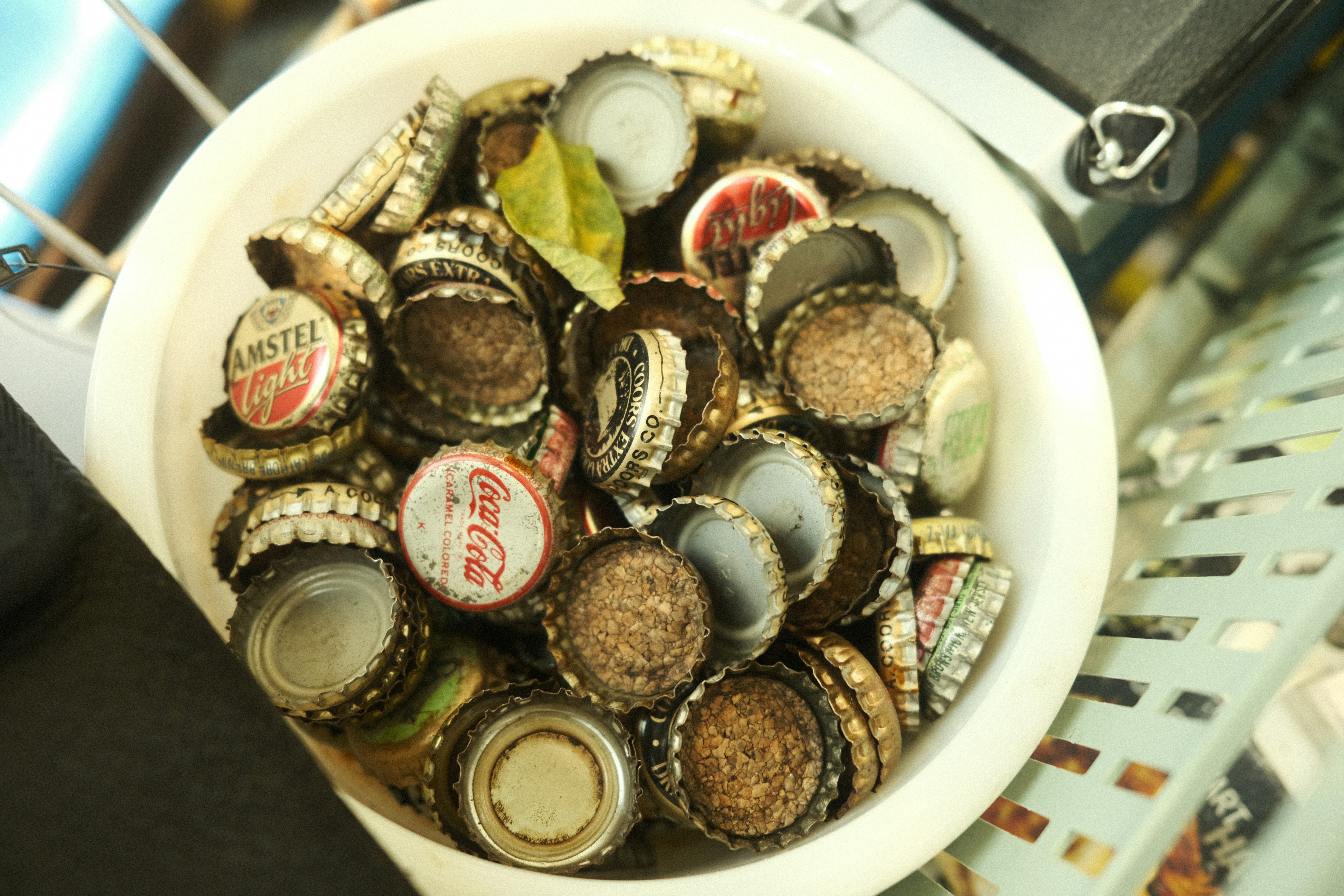 Capsule Harvest: A Bowl of Beer Bottle Caps.