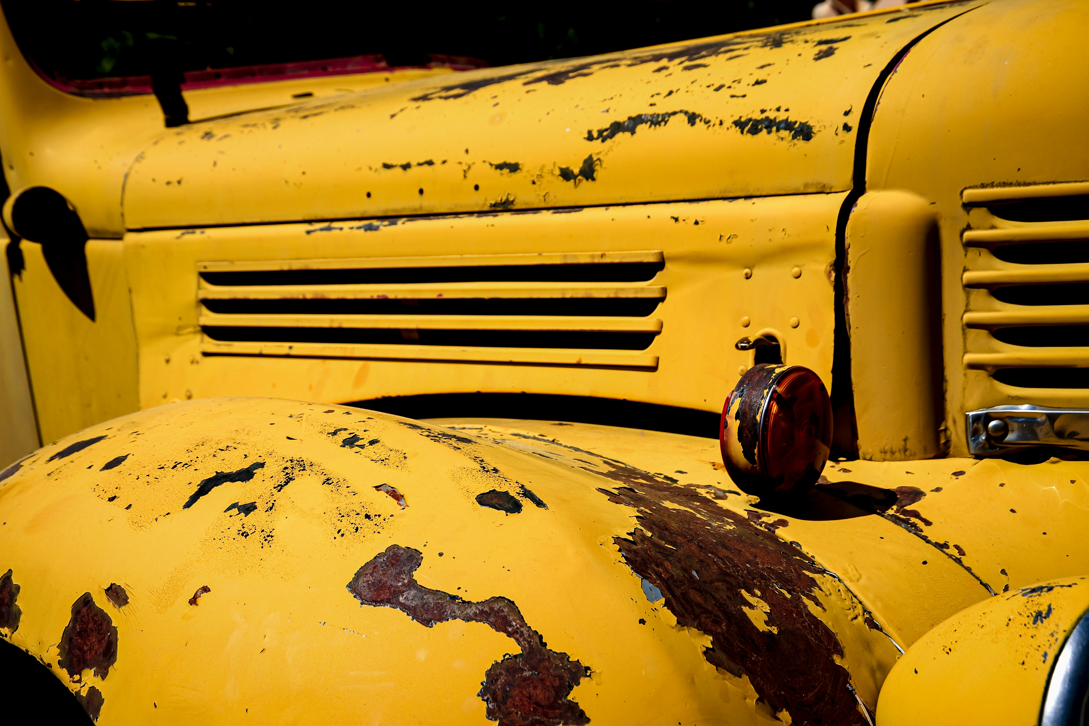 Chipped Yellow Gauge: A Rusted Turn of Soul on a Vintage Vehicle