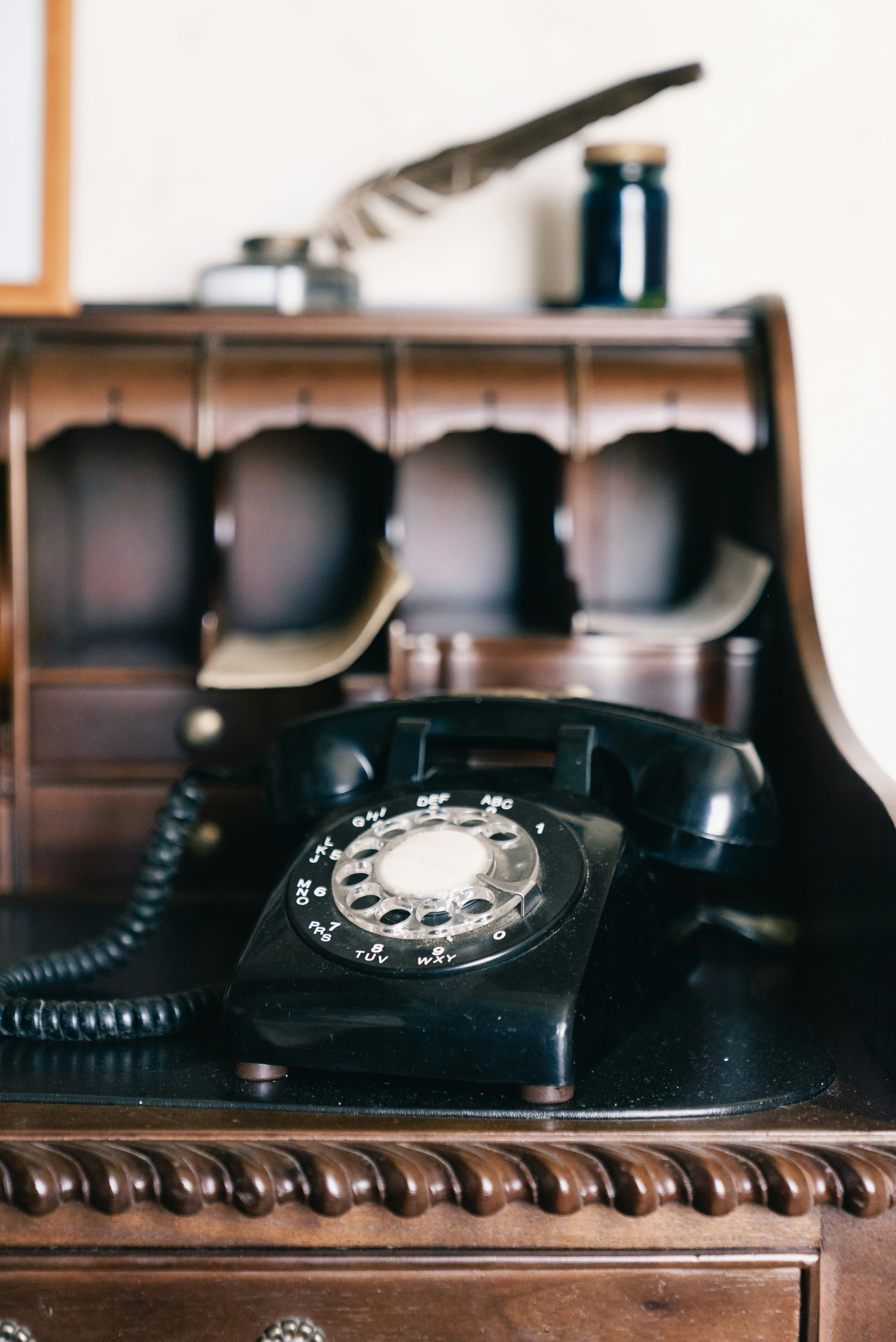 Midnight Dial: A Classic Rotary on a Carved Desk