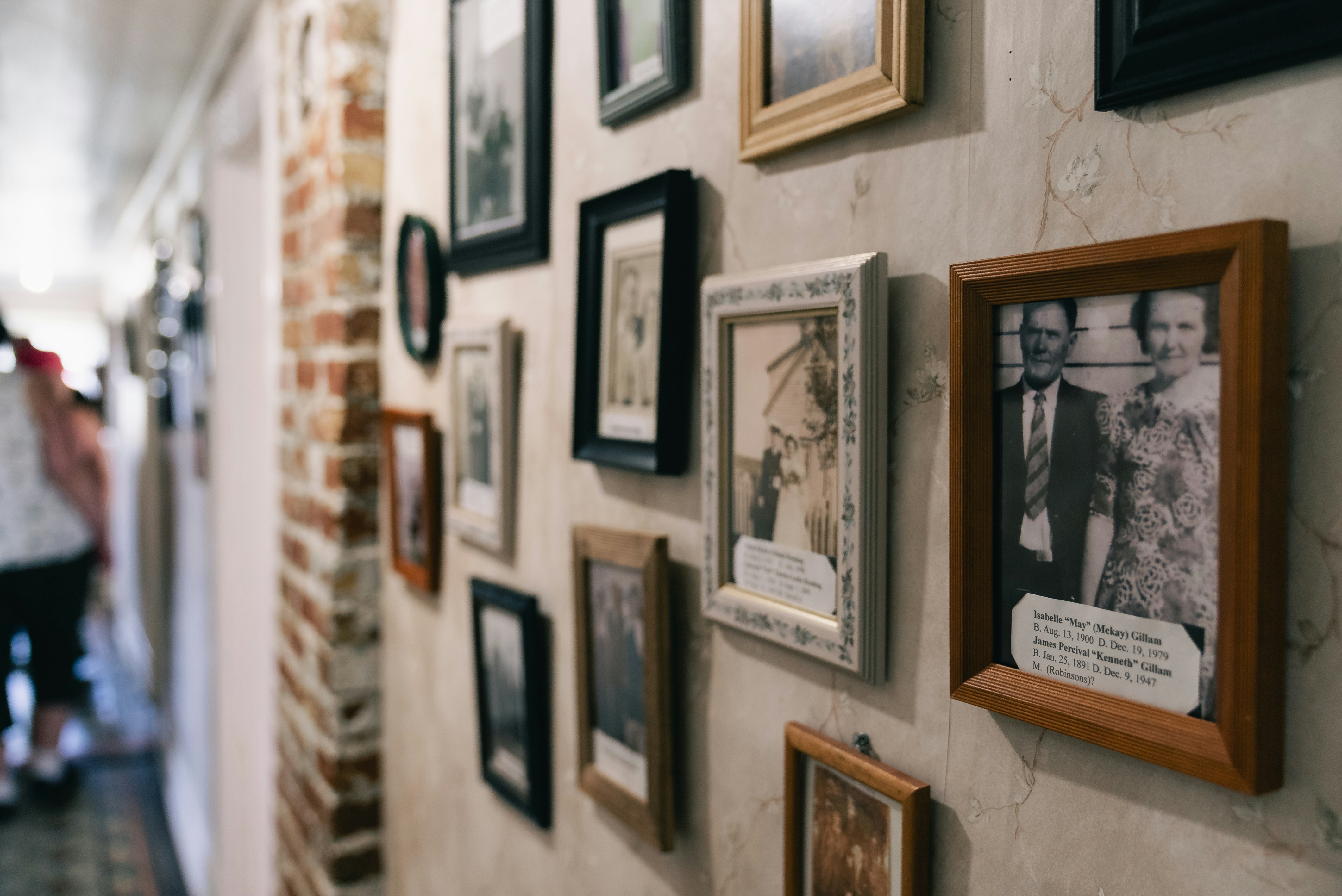 Framed memories lining a quiet corridor