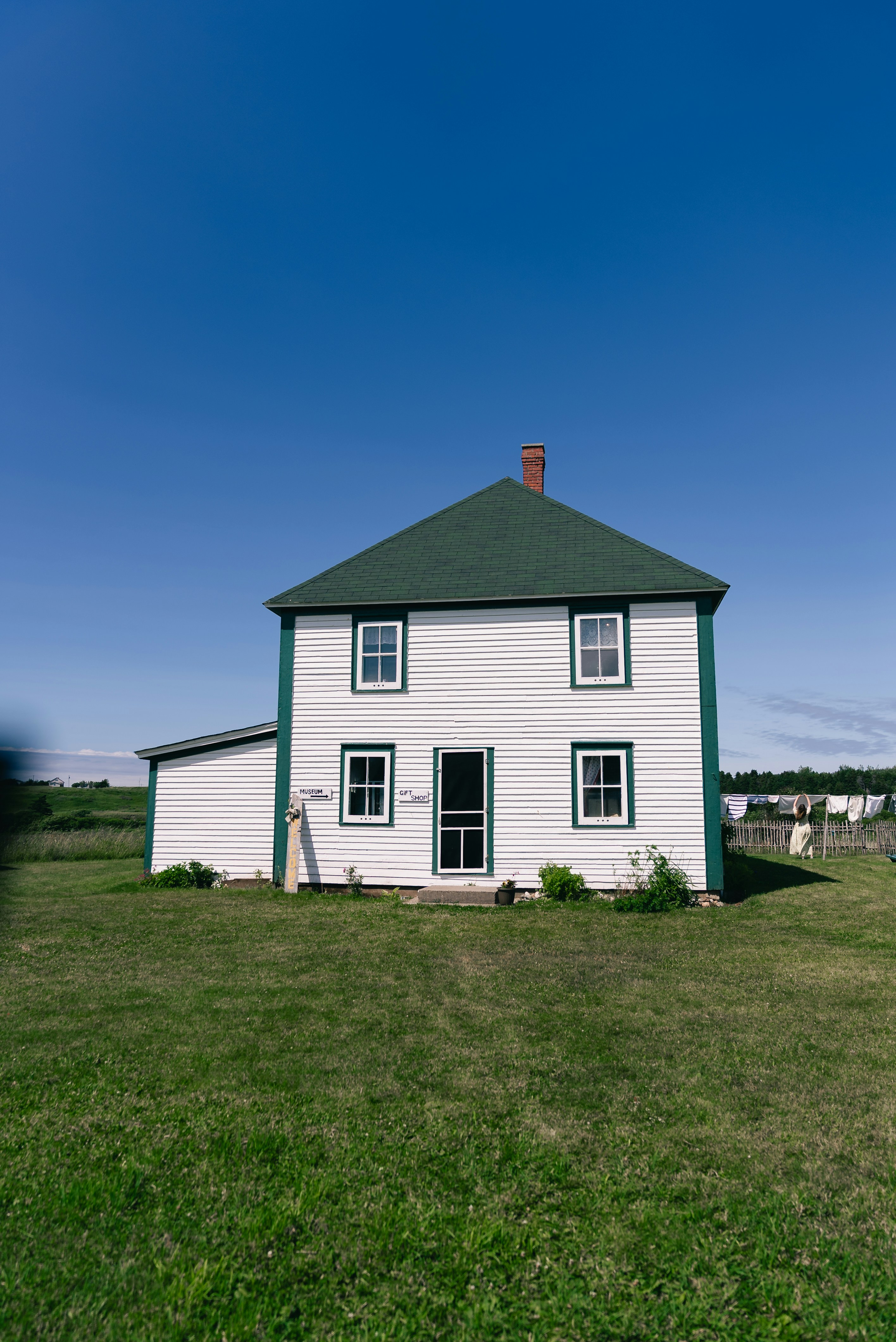 A Quiet Farmhouse Under a Clear Blue Dome