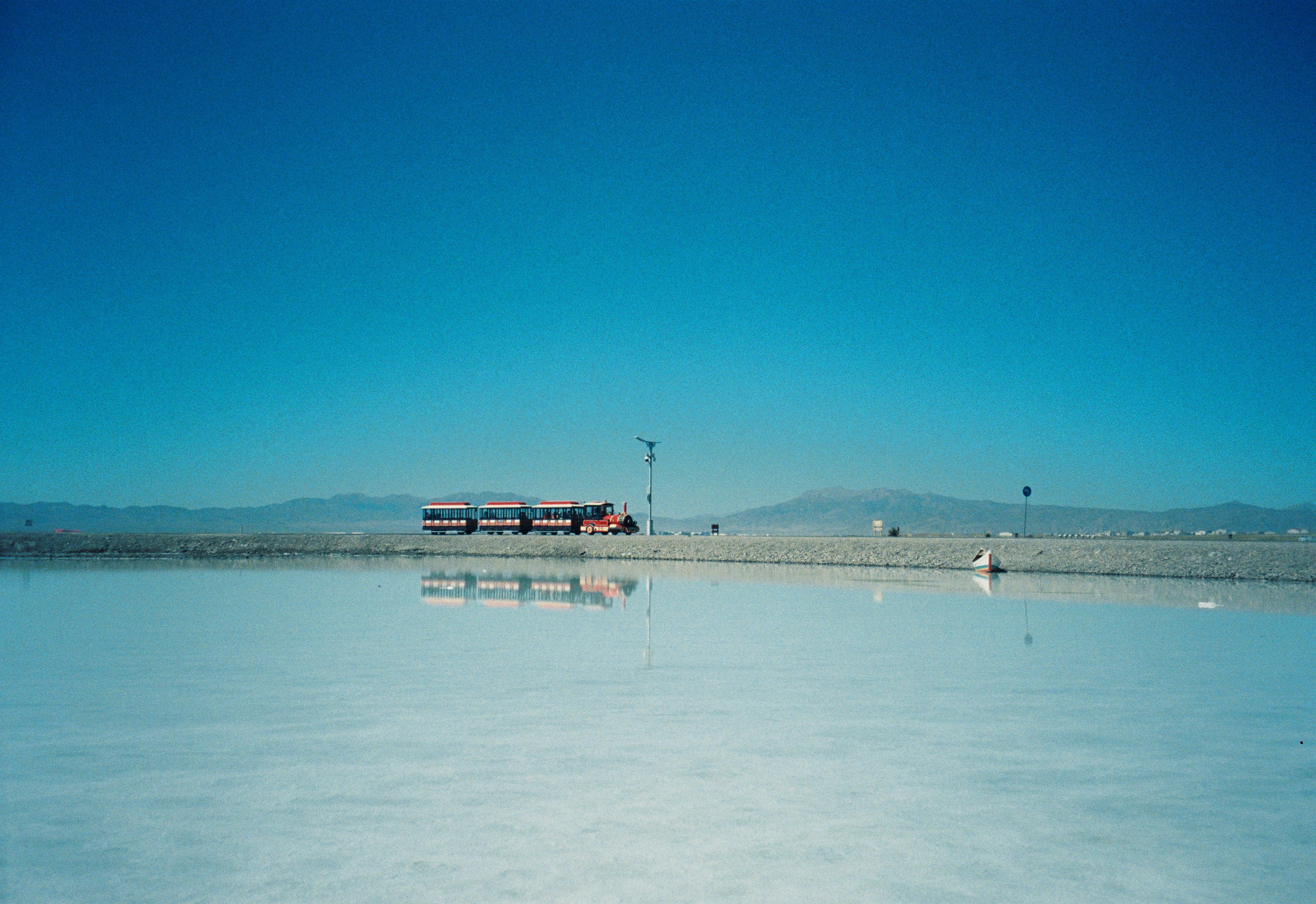 Lonely Train at the Salt Flat Horizon