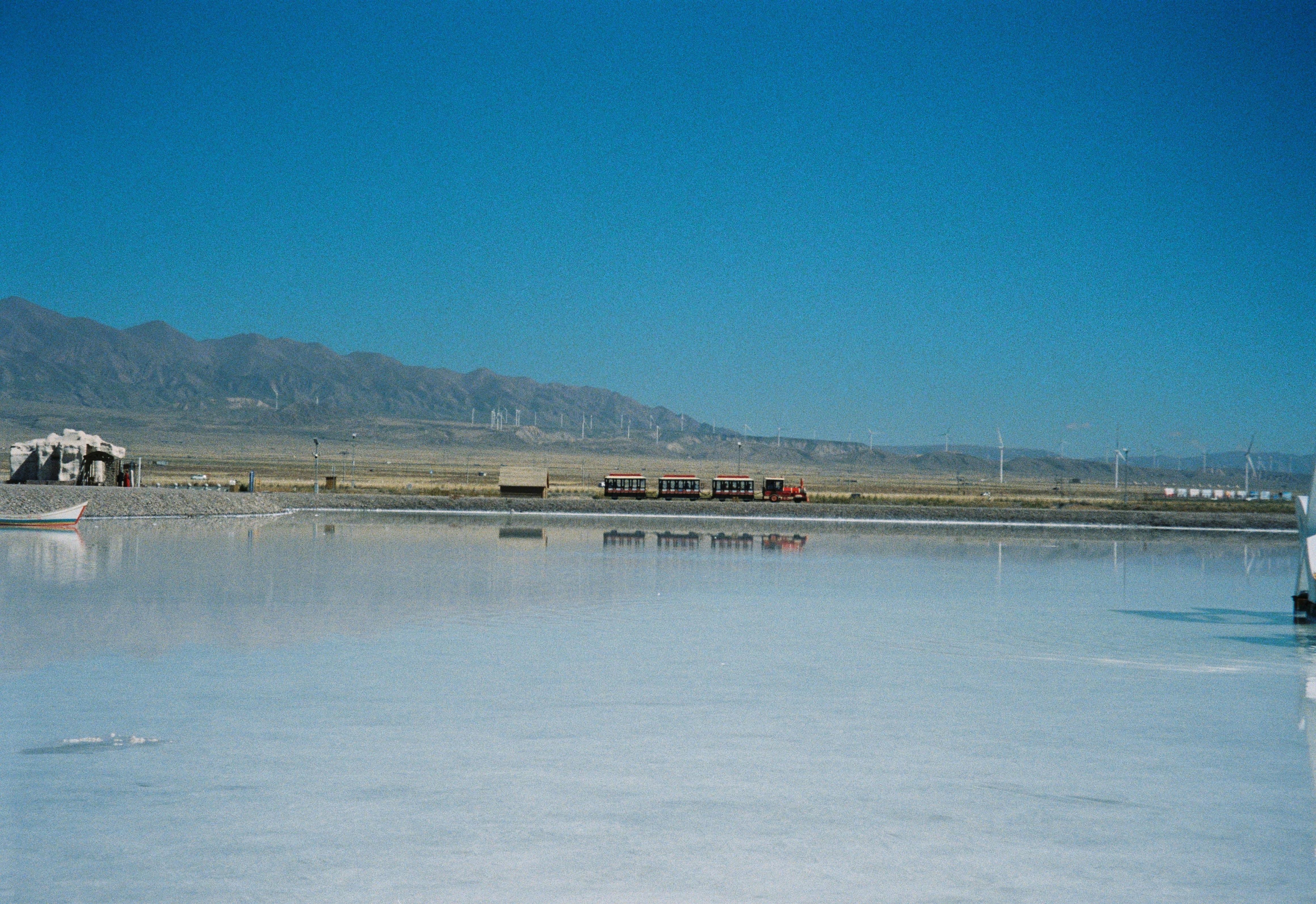 Salt Flats at Dawn: A Quiet Horizon over a Mirror-Like Basin