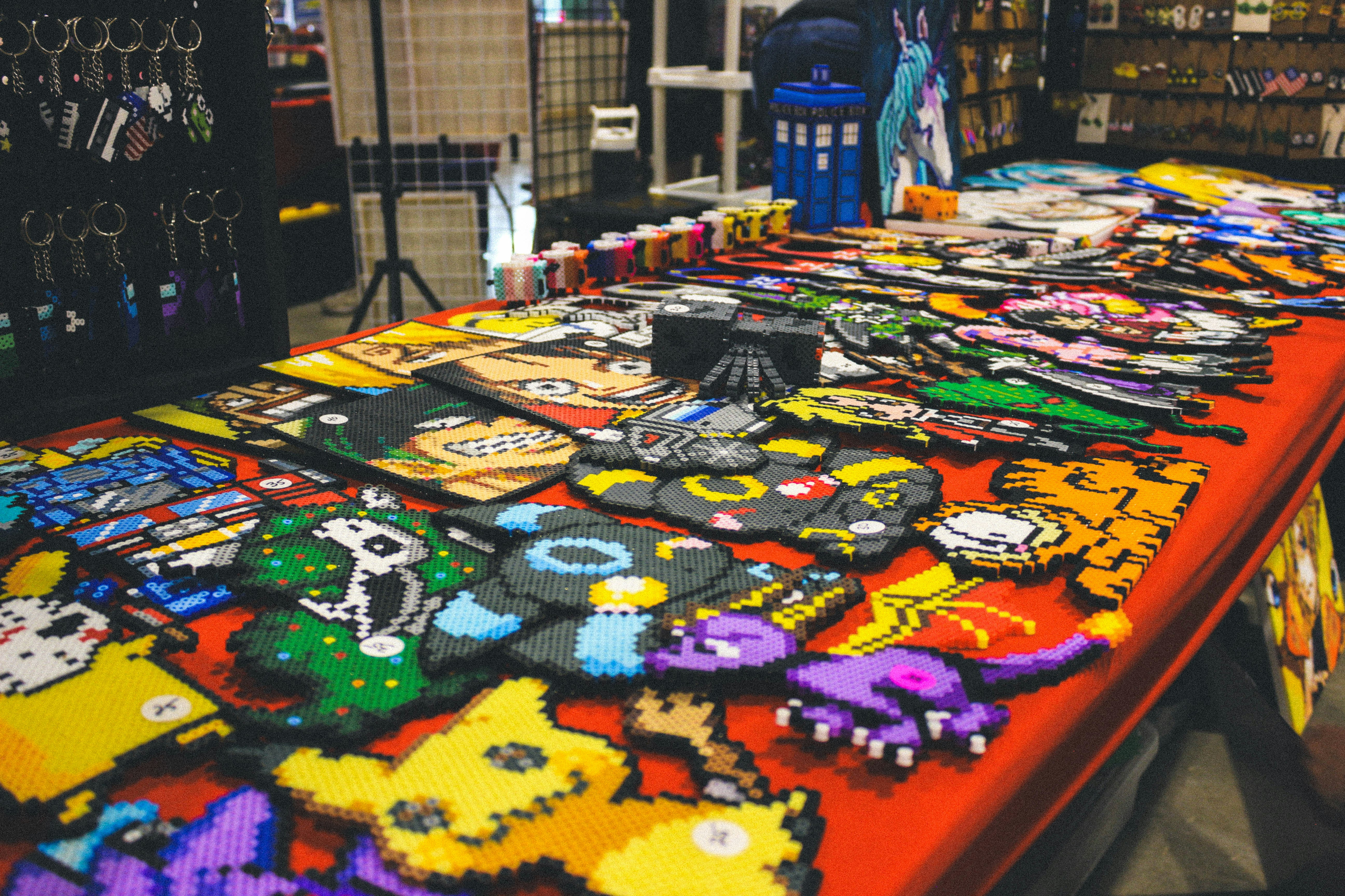 Vibrant Charms: A Stall of Pixelated Plush and Pixel Art Mementos