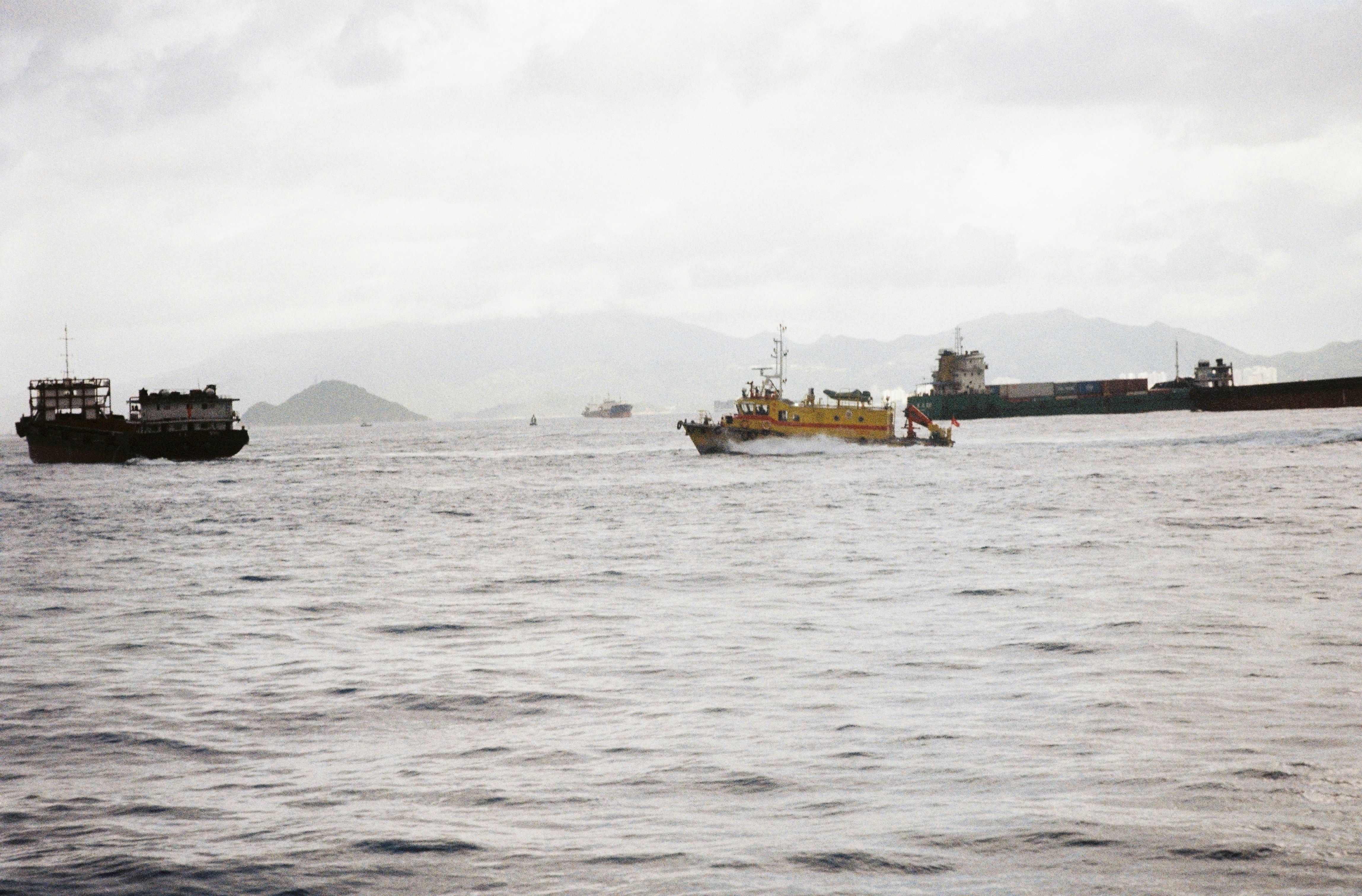Ferry Convoy at Dusk: A Quiet Harbor With Working Vessels