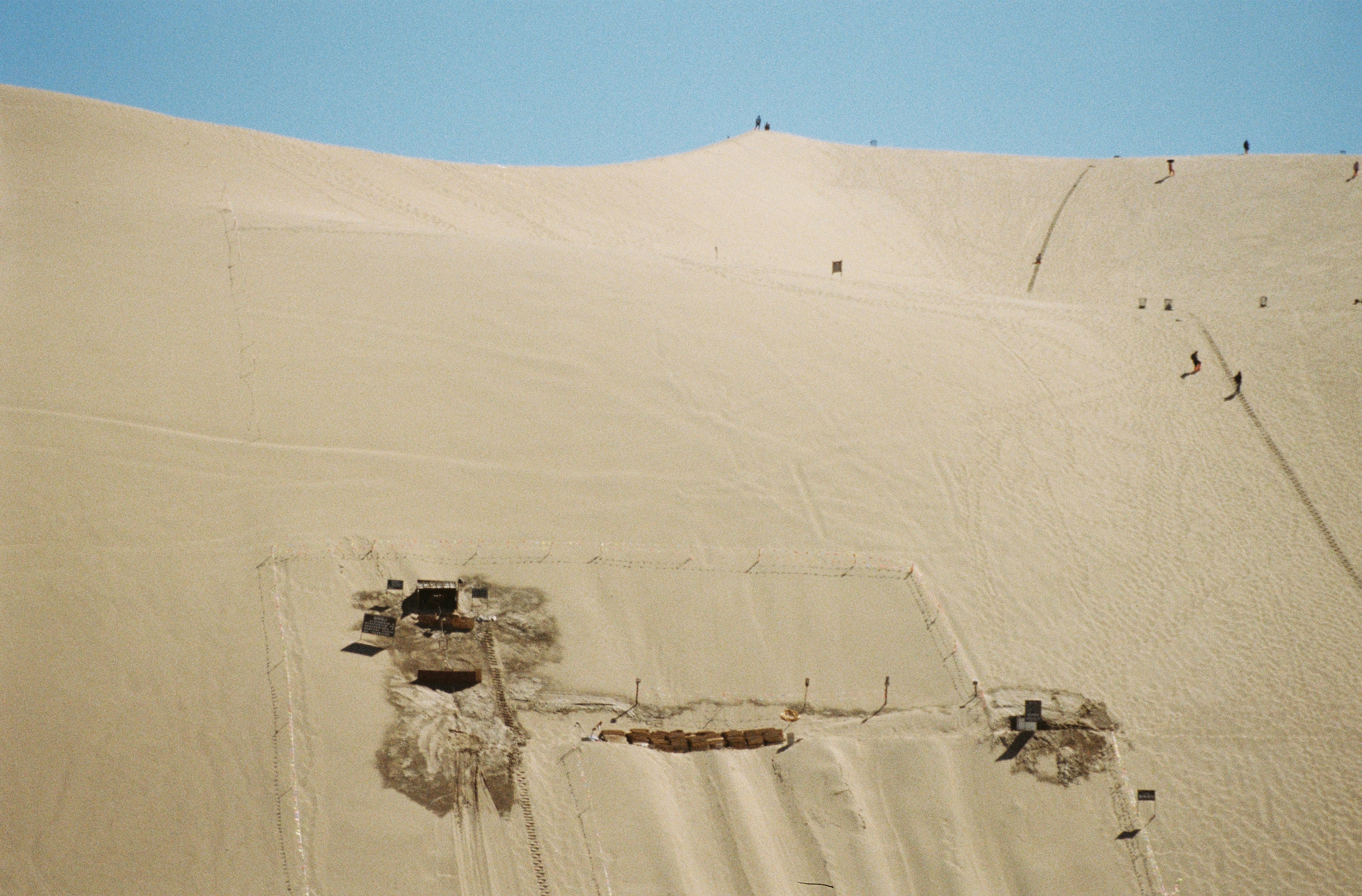Desert Dune Ridge with Sparse Climbers