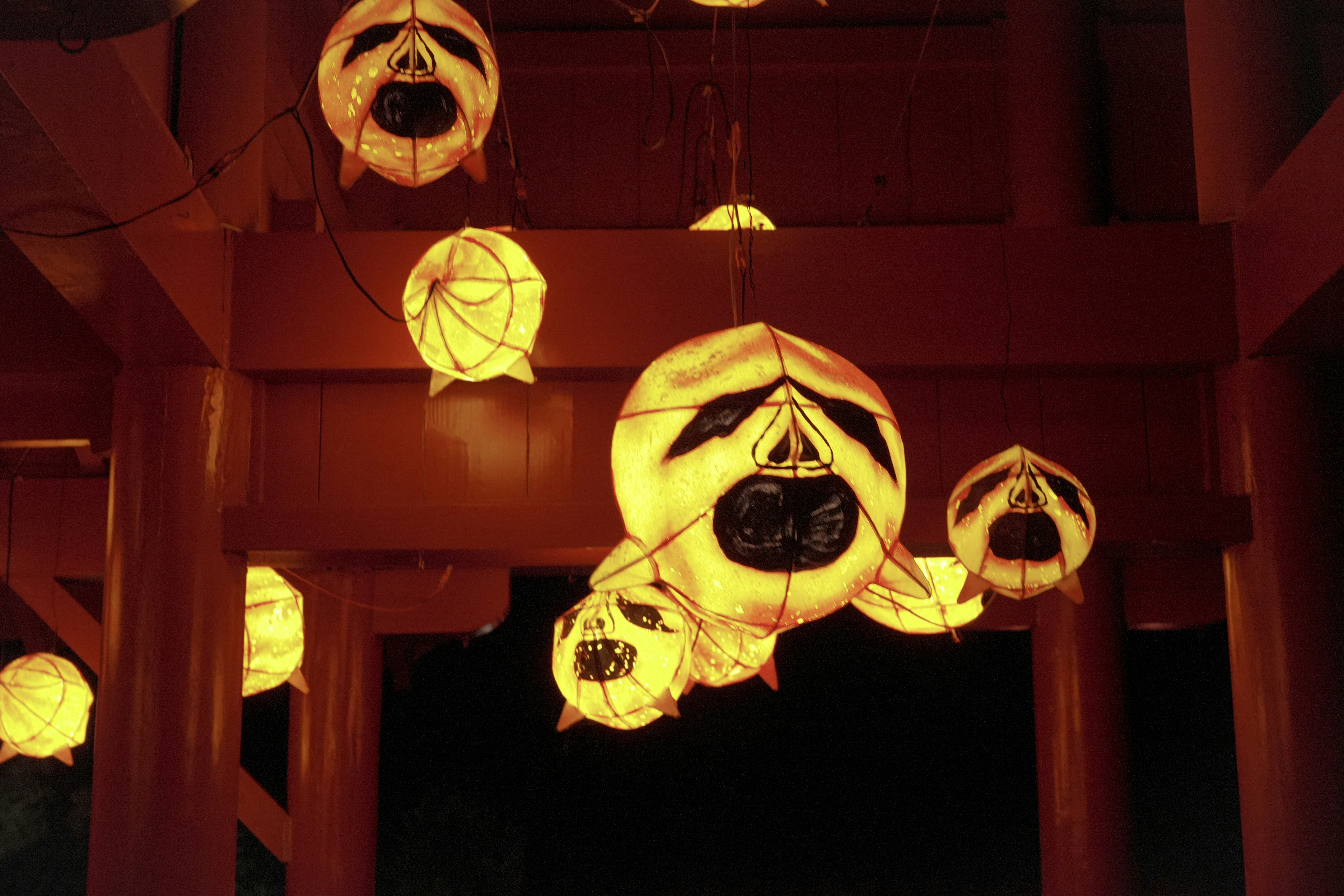 Luminous Lantern Cascade in a Night Shrine