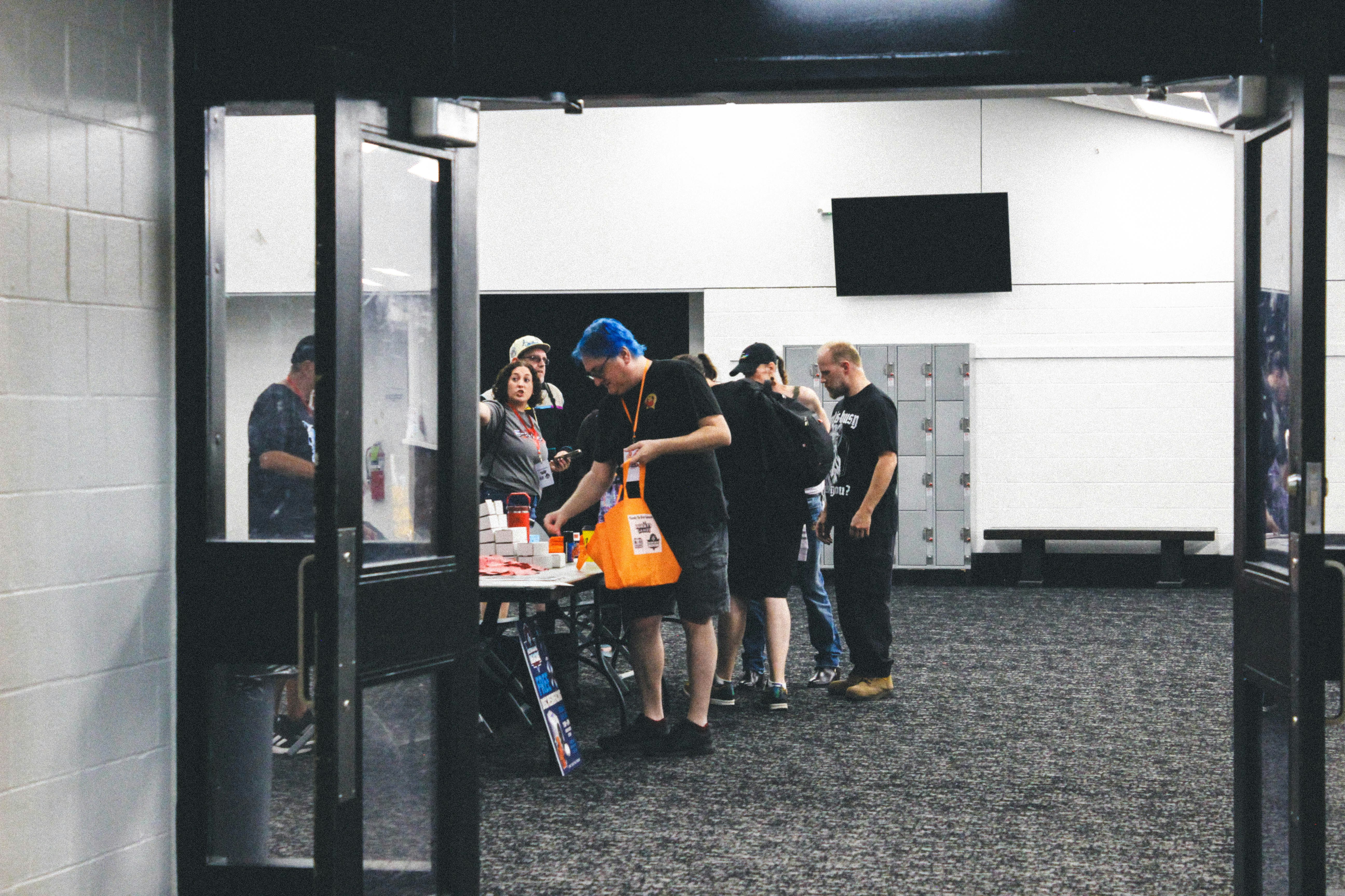 Beyond the Glass: A Frank Check-in in the Corridor
