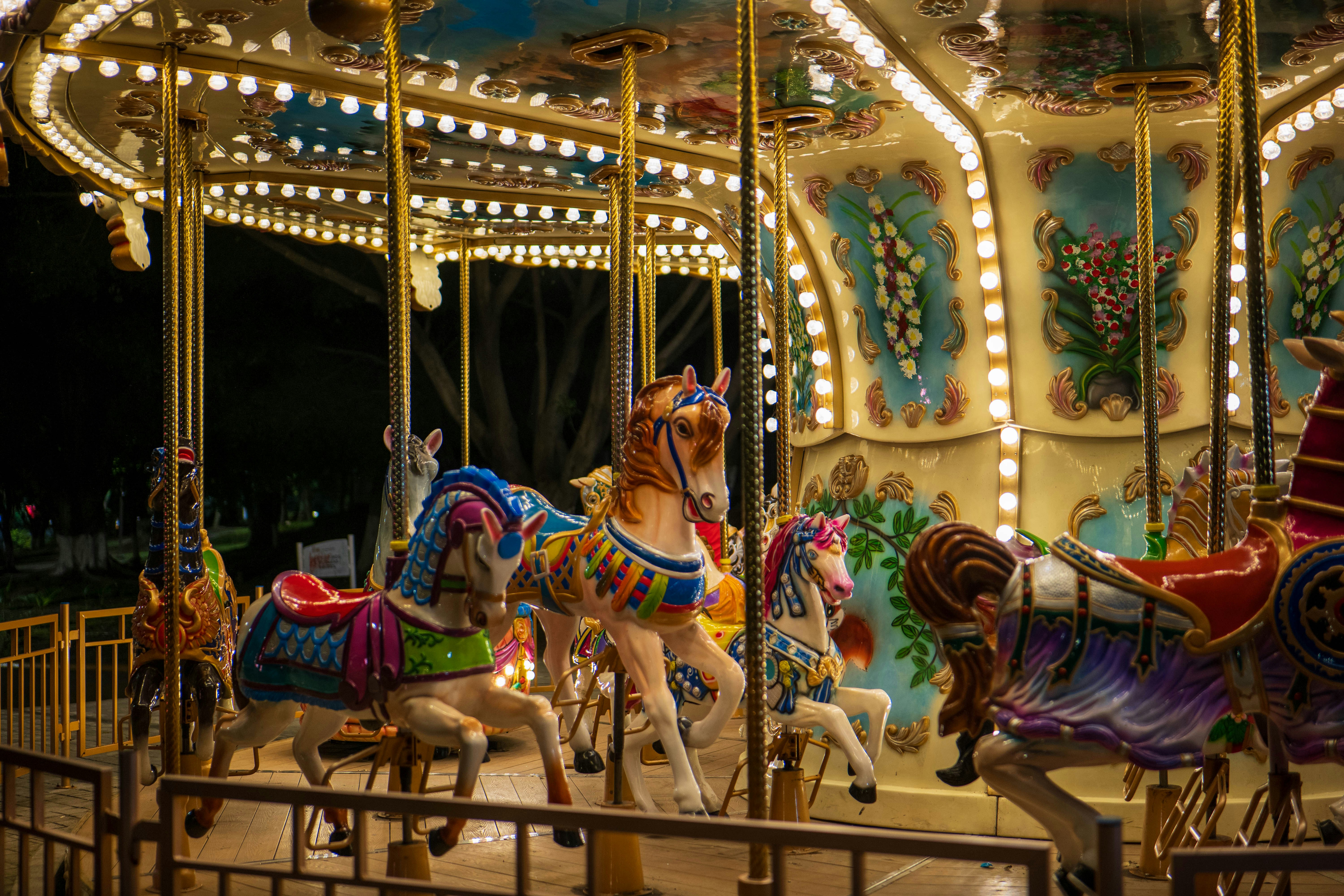 Moonlit Carousel: Painted Horses Beneath Glowing Ornaments