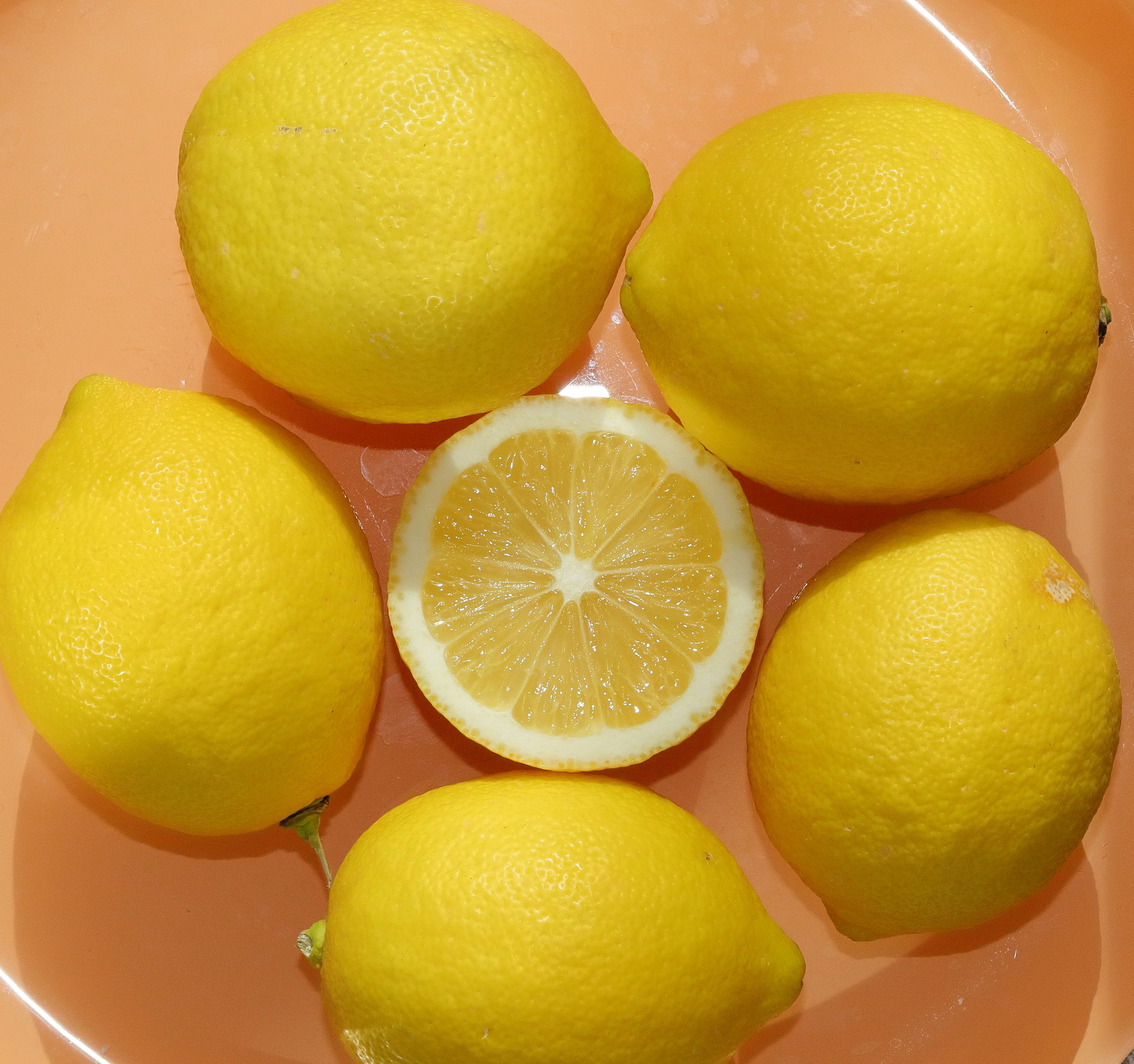 Citrus Quartet: Central Halved Lemon Framed by Golden Orbs
