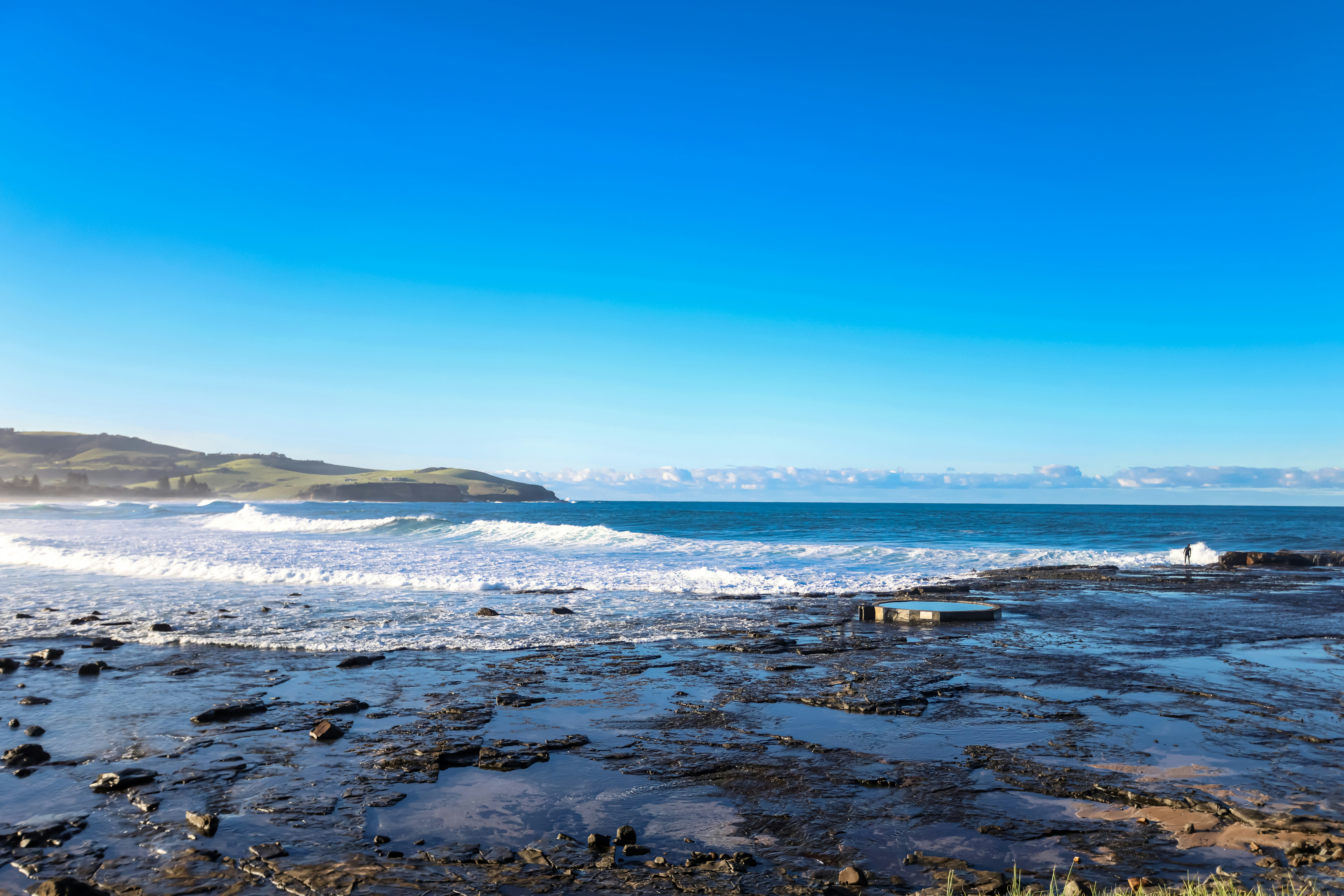Coastal Horizon Under a Clear Blue Sky