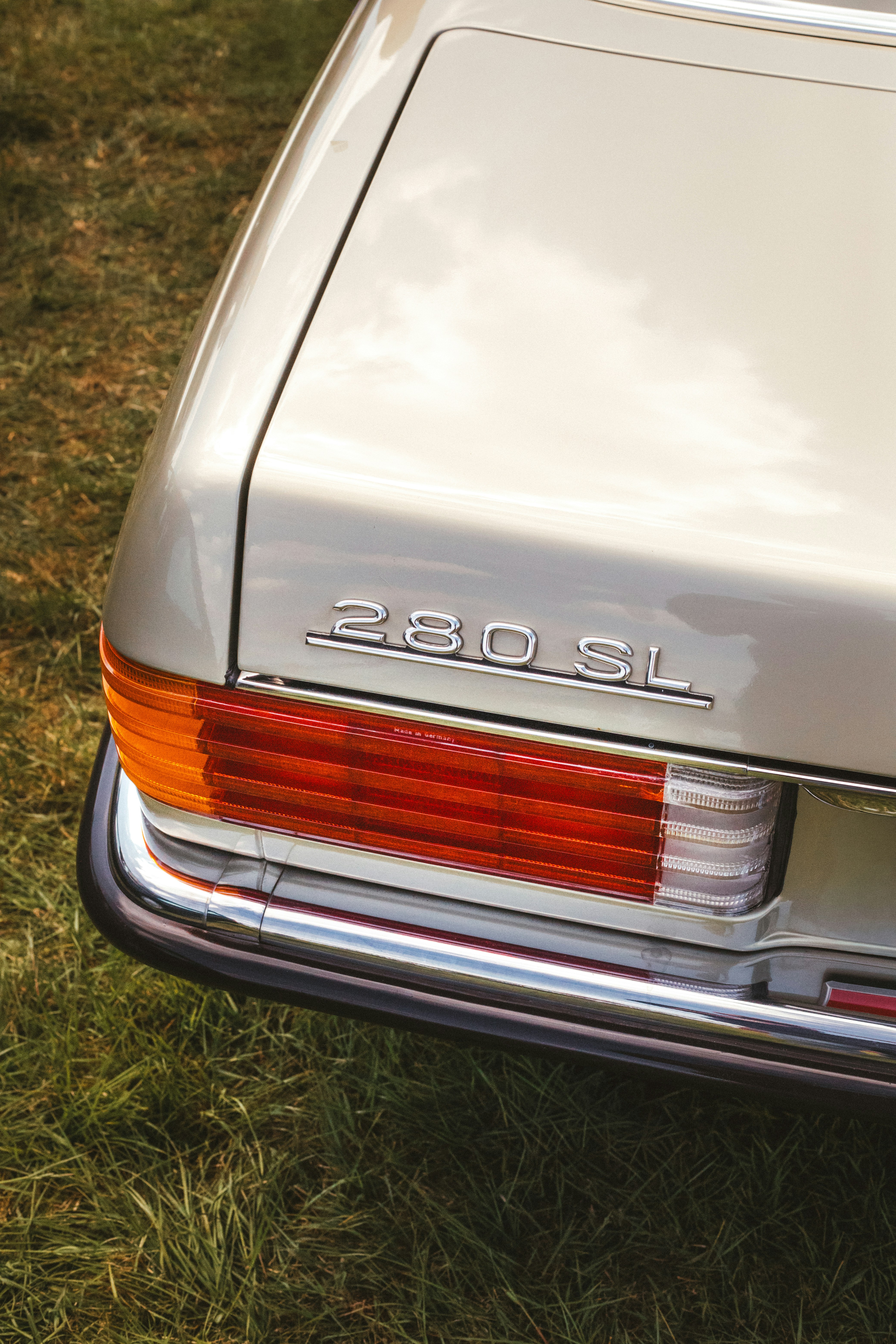Rear Badge Reverie: A Classic Silver Finish and Tail Light Whisper