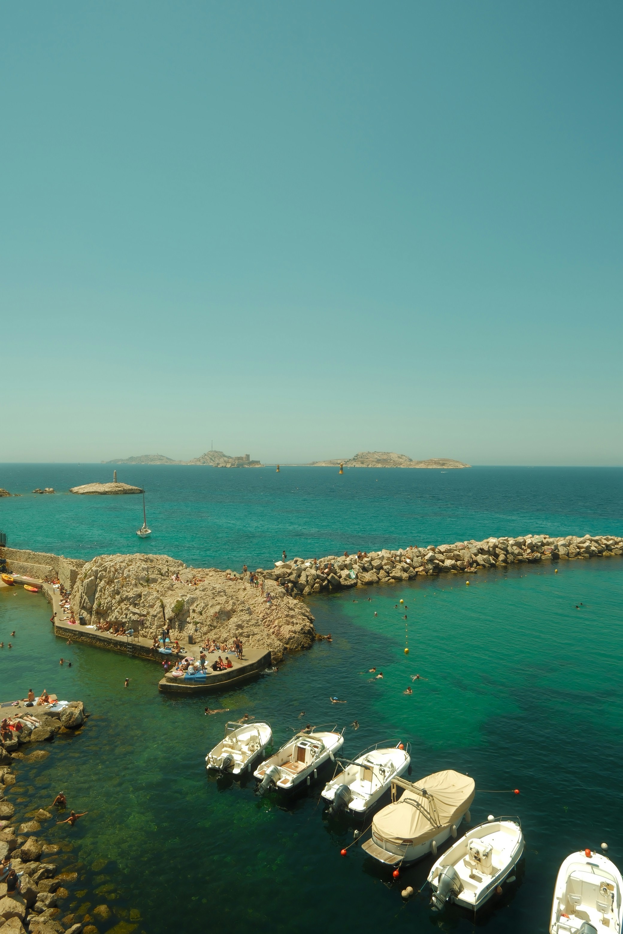 Harbor Quiet: Boats Rest in a Mediterranean Dawn