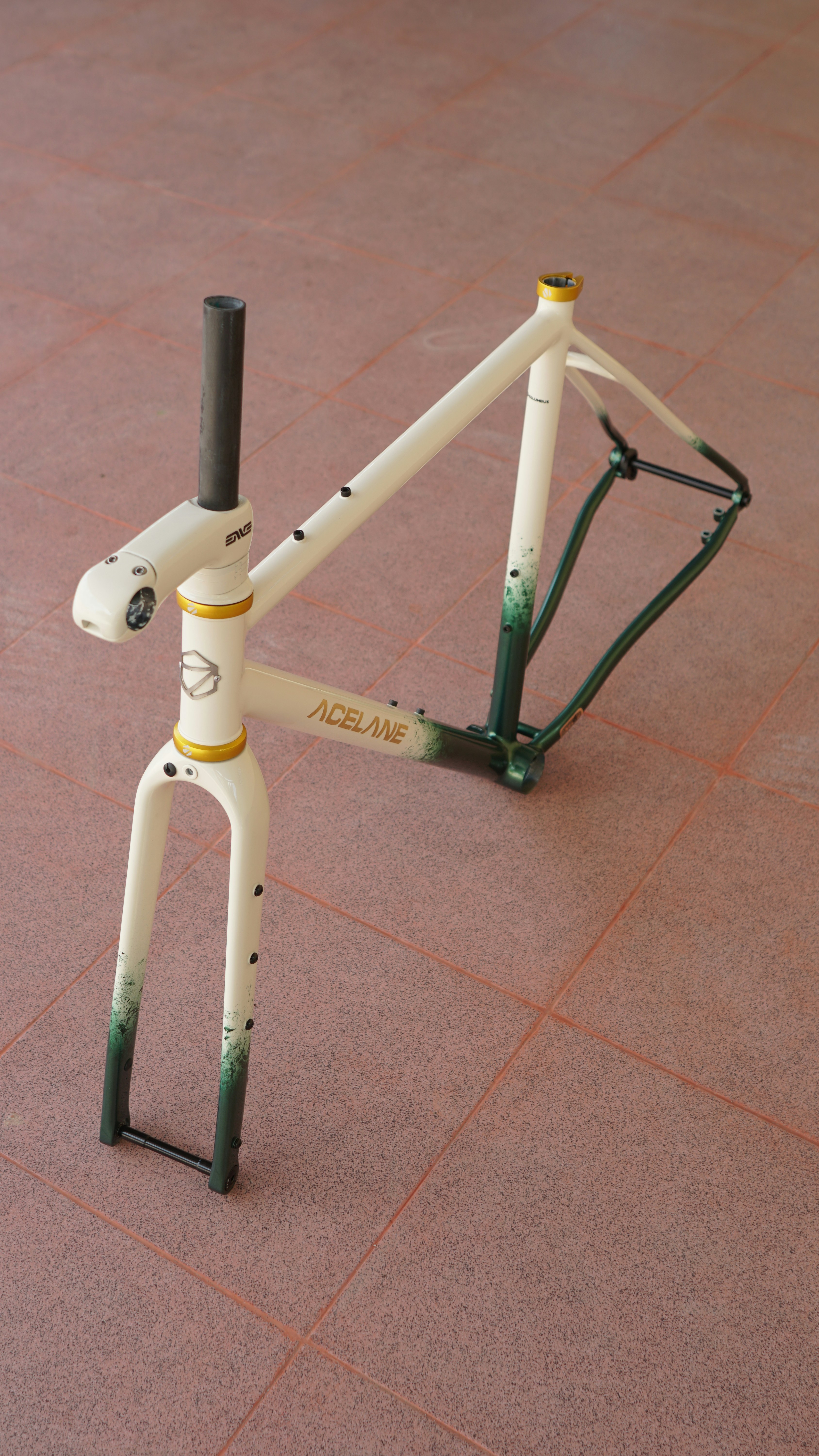 Disassembled Cyclocross Frame: Creamy Paint Meets Emerald Fade