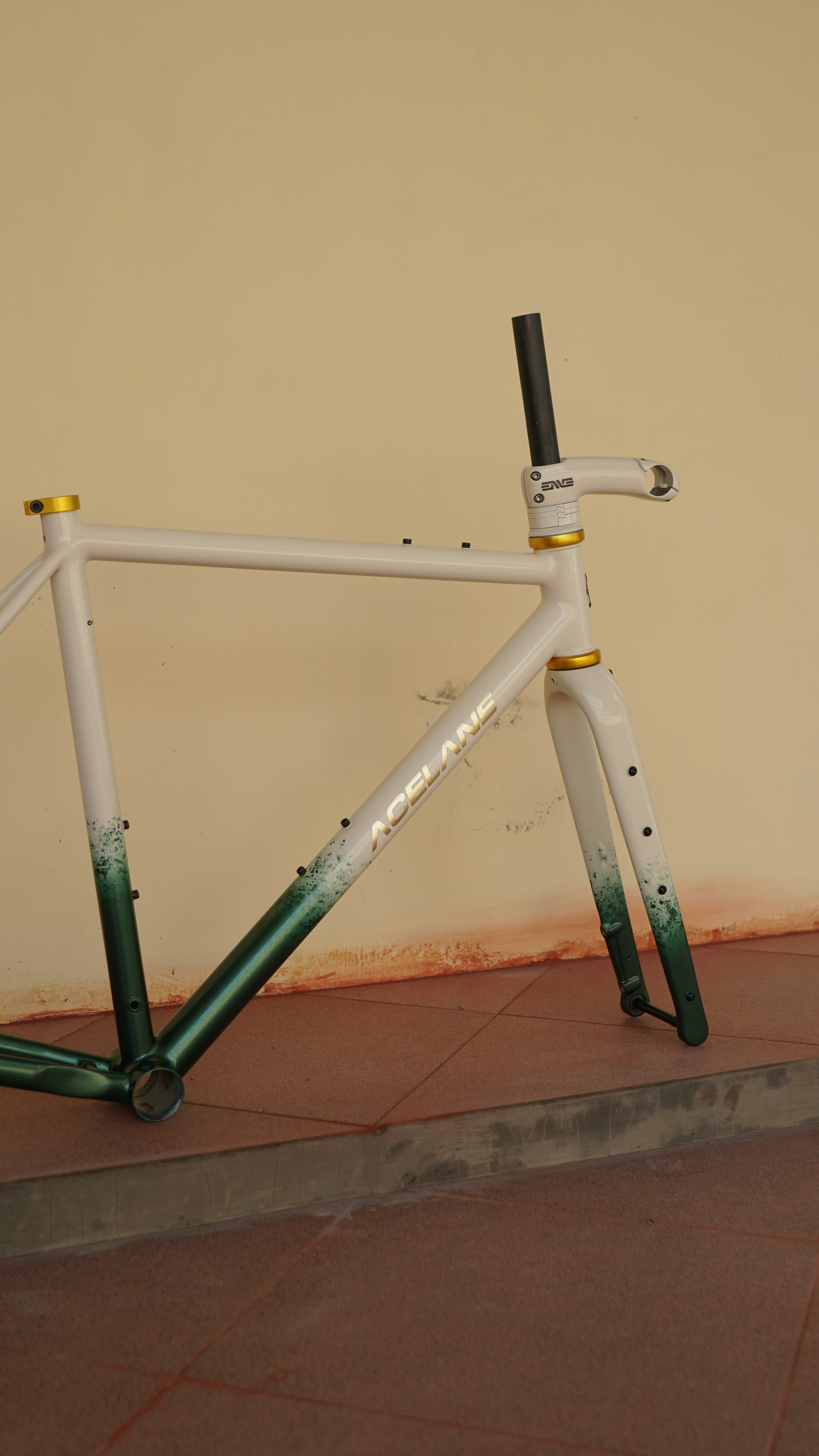 Cerulean Dreams: A Bicycle Frame Grounded Against a Warm Wall