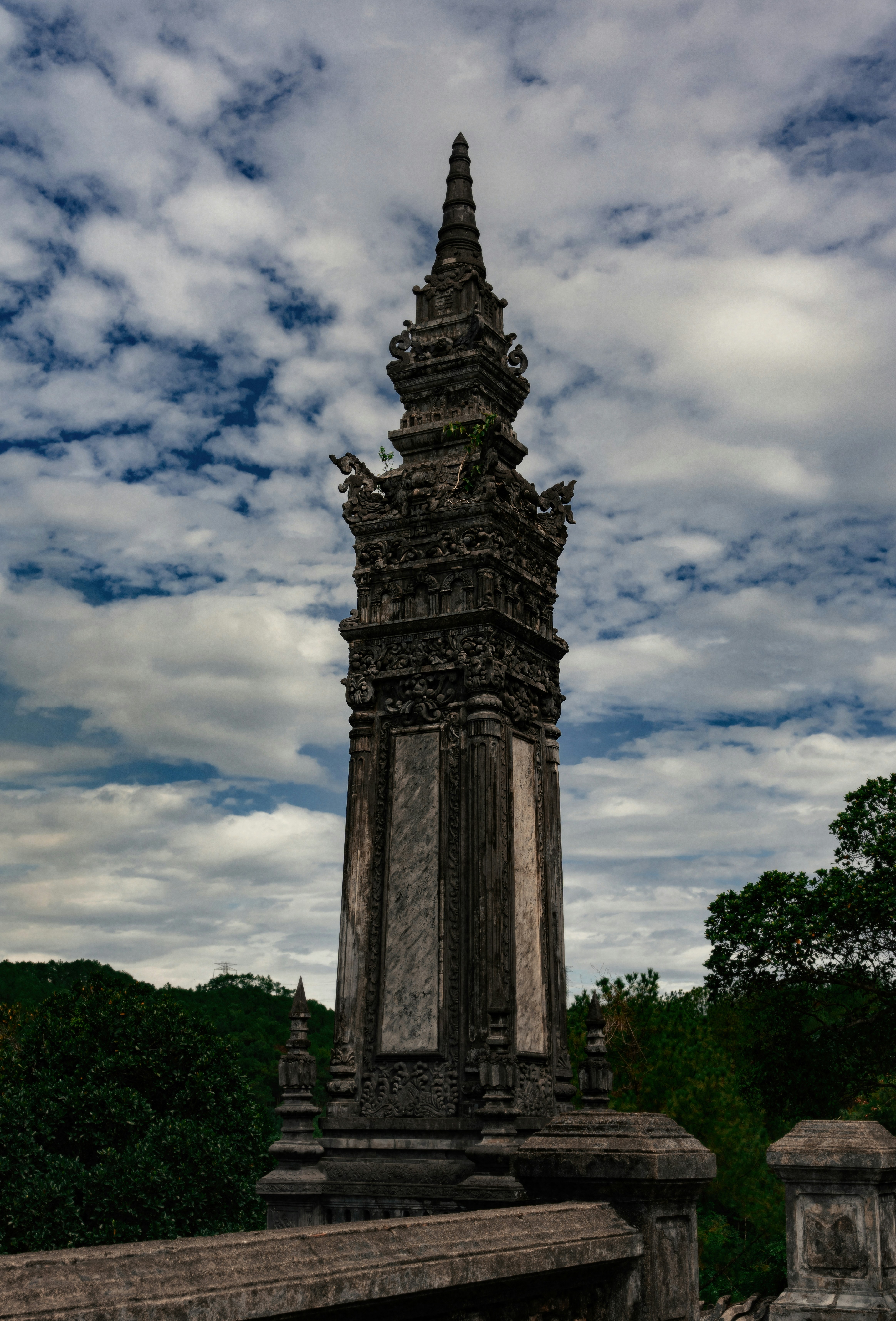 Stone Spire Ascent: Carved Obelisk Reaching Toward The Sky