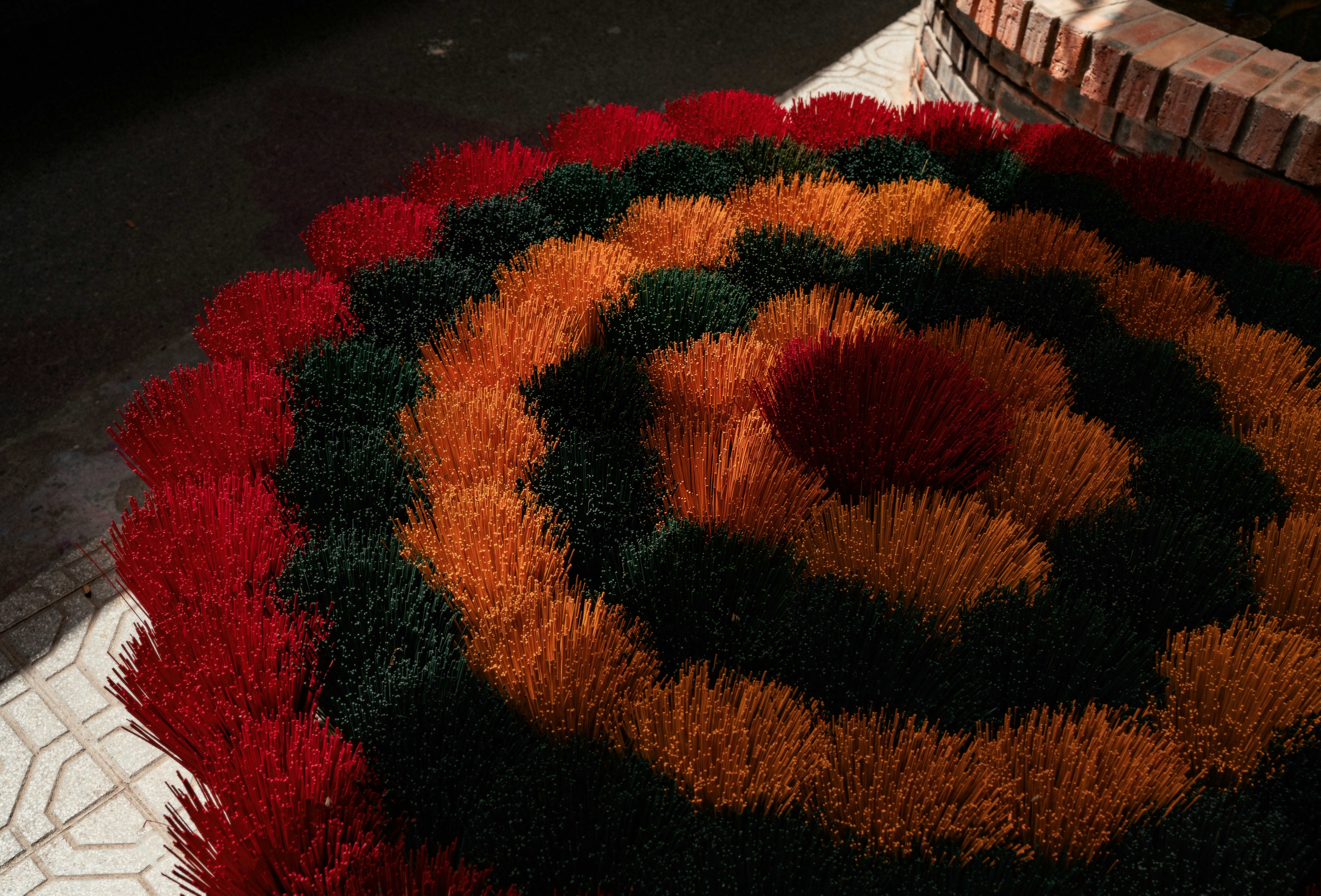 Spiral Rug of Fire: A Multilayered Doormat Unfolding in Color