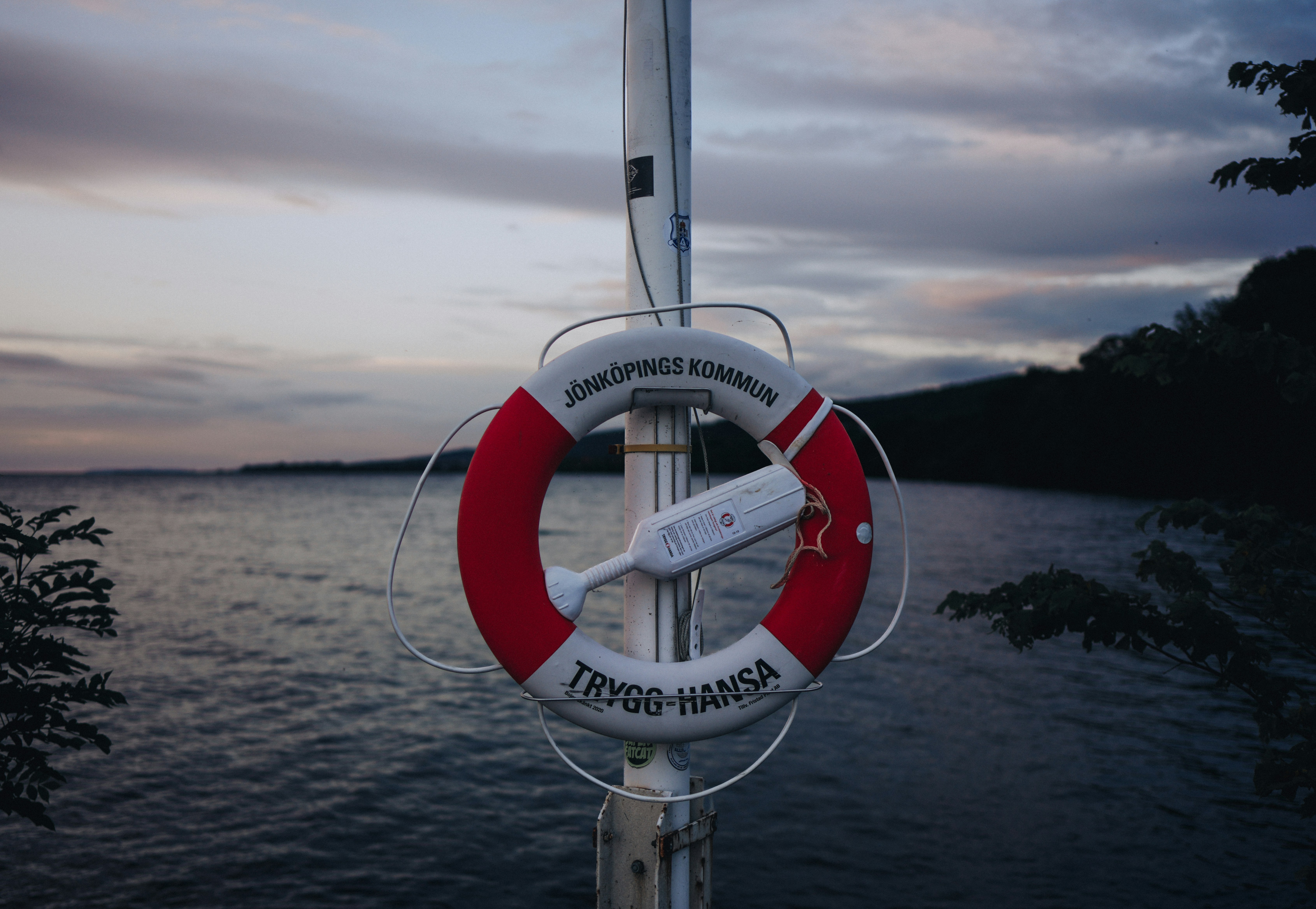 Lifesaver at Dusk by the Quiet Lake