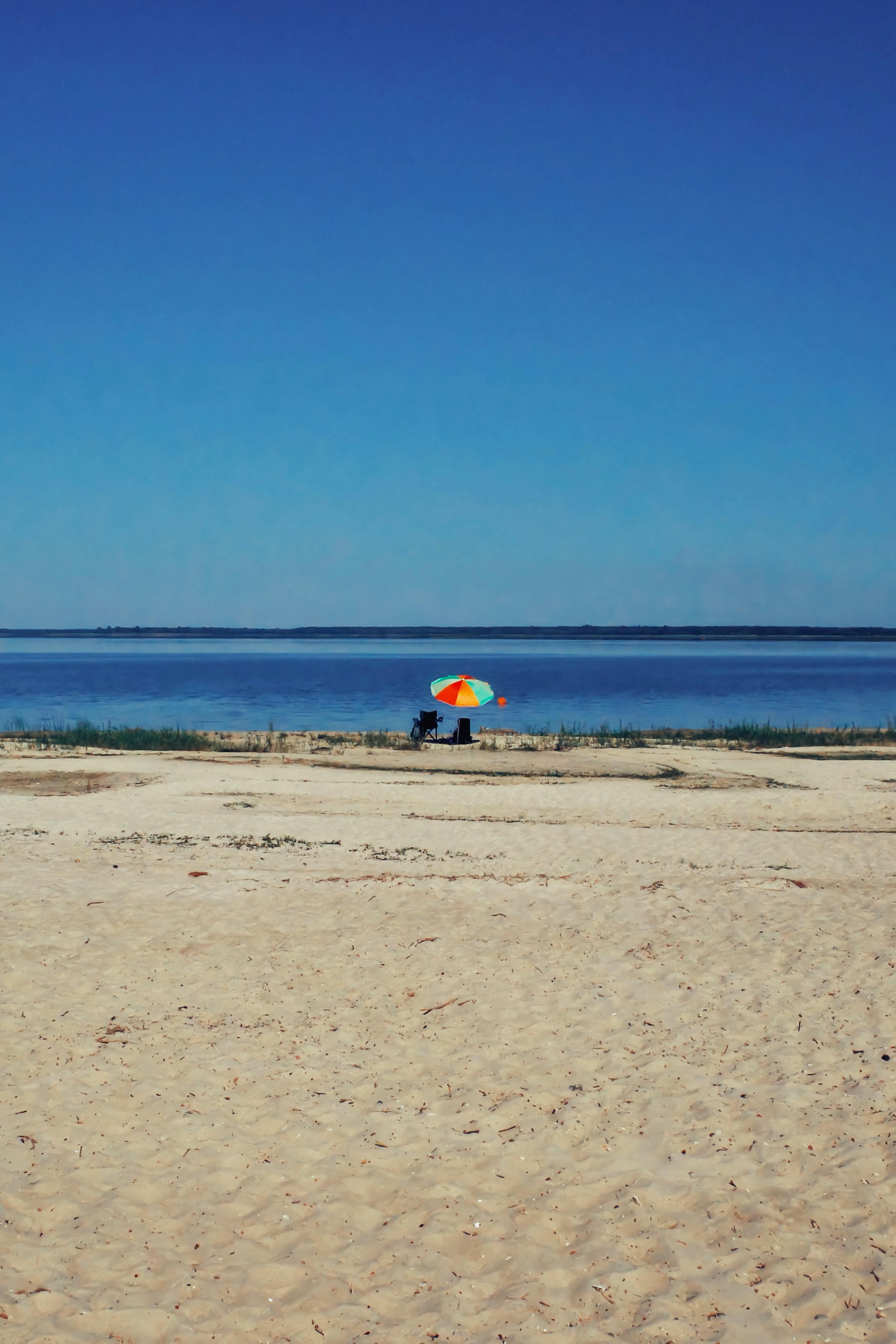 Solitary Beach Umbrella at the Quiet Shore