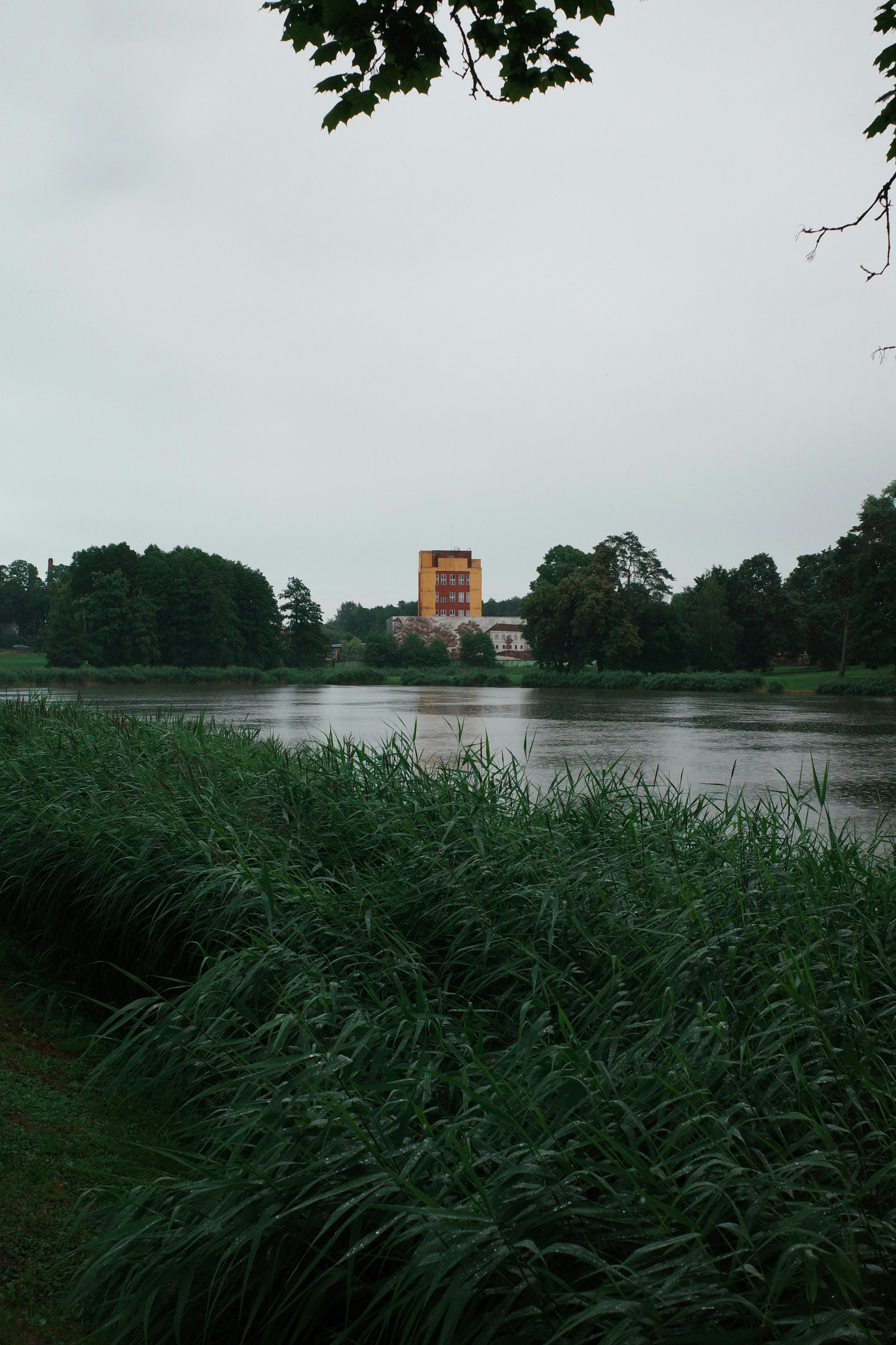 Towerrise Over the River: A Quiet Day by the Water