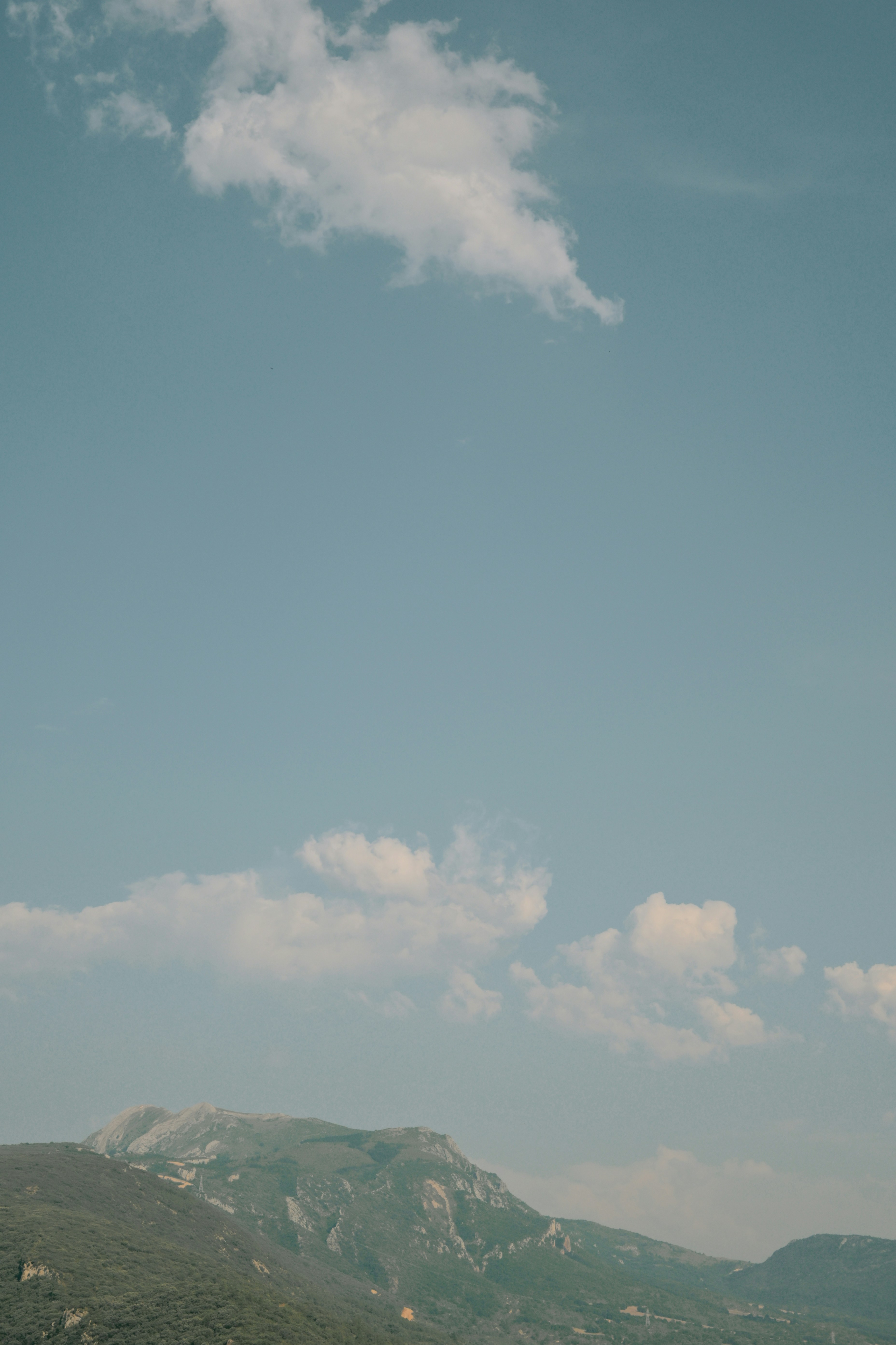 Quiet Horizon: Rocky Ridge Under Wide Open Sky
