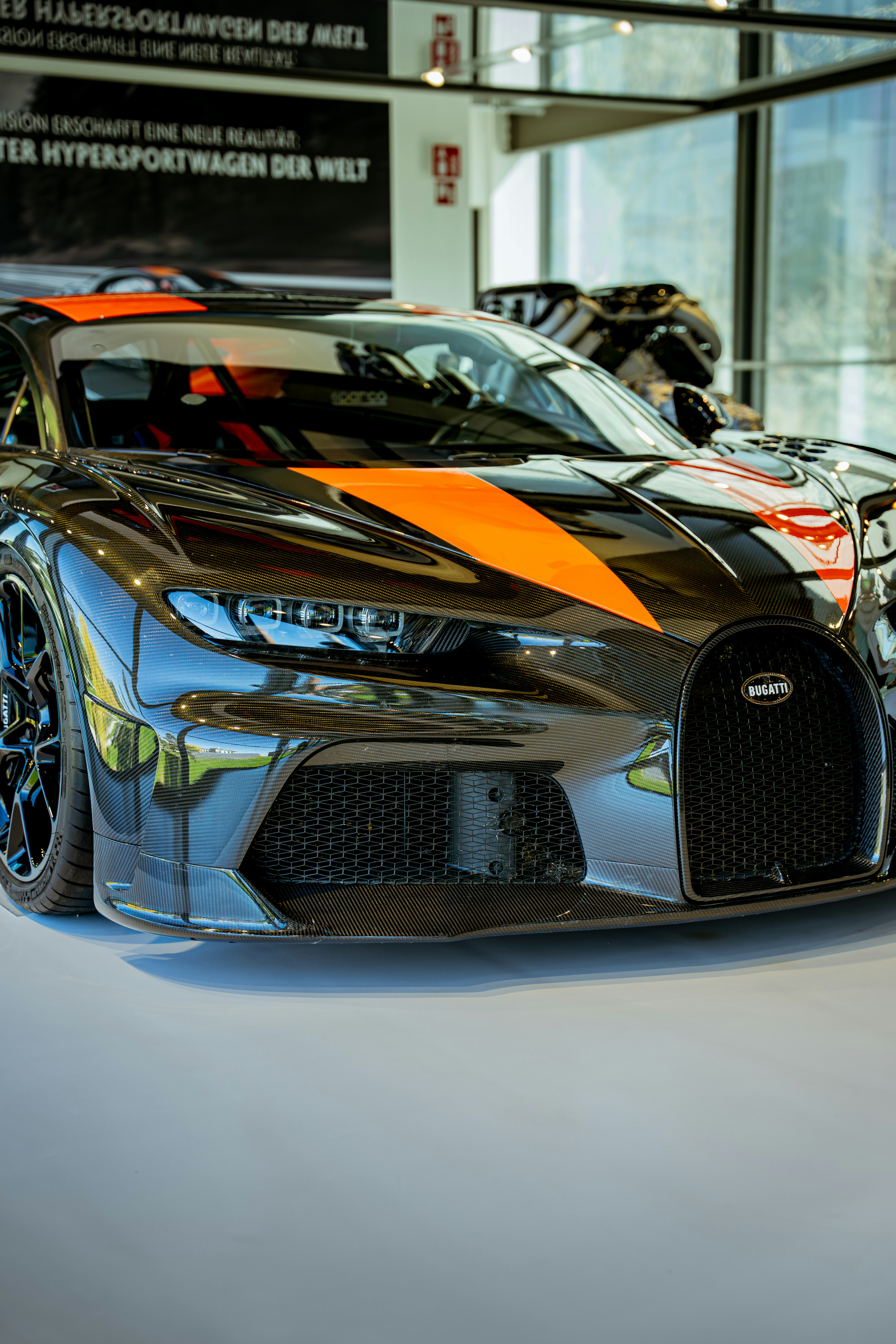 Front-Quarter Brilliance: A Bugatti Chiron in an Automotive Showroom