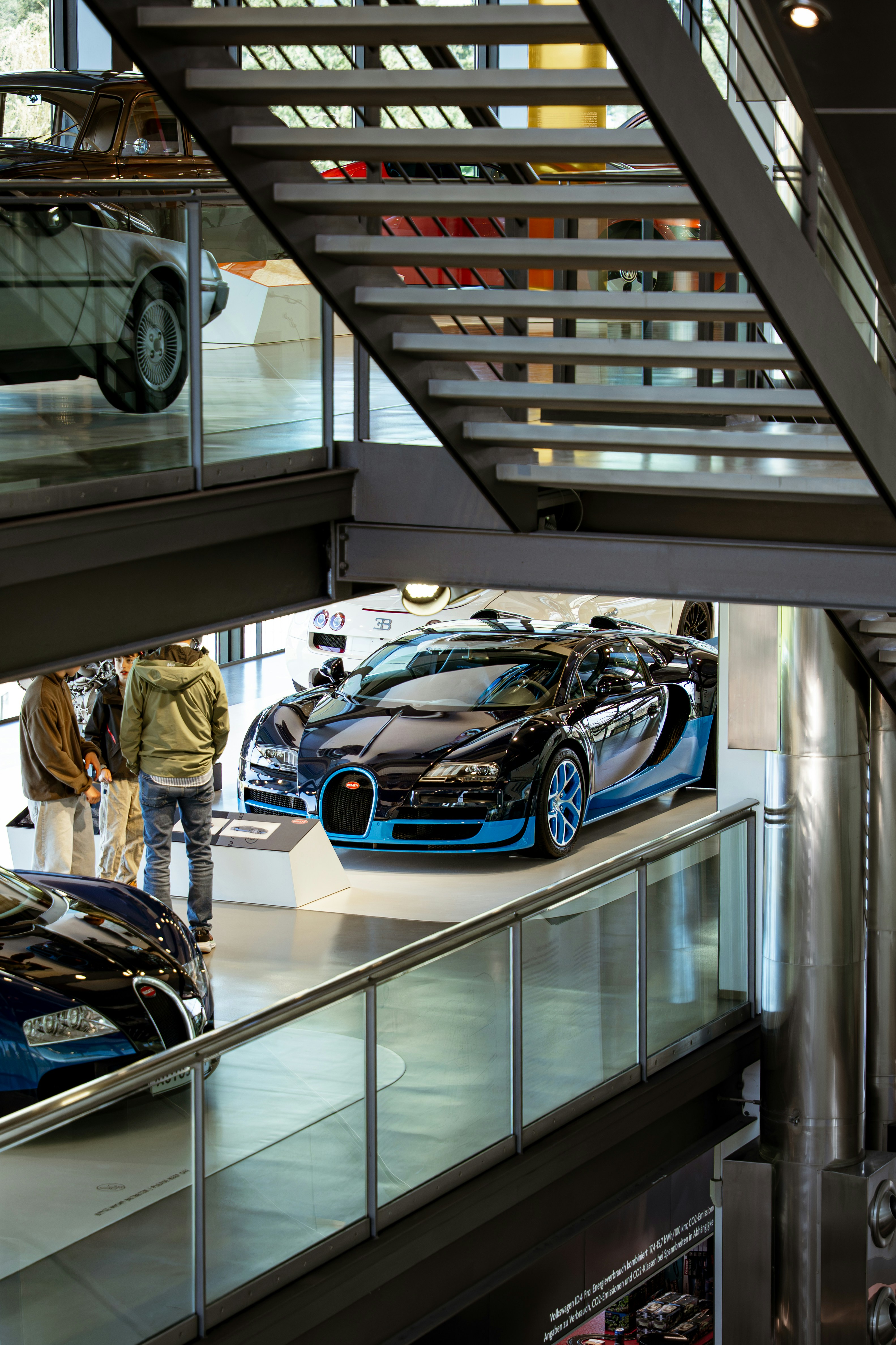 Under the Grand Stair: A Bugatti Spotlight in the Showroom