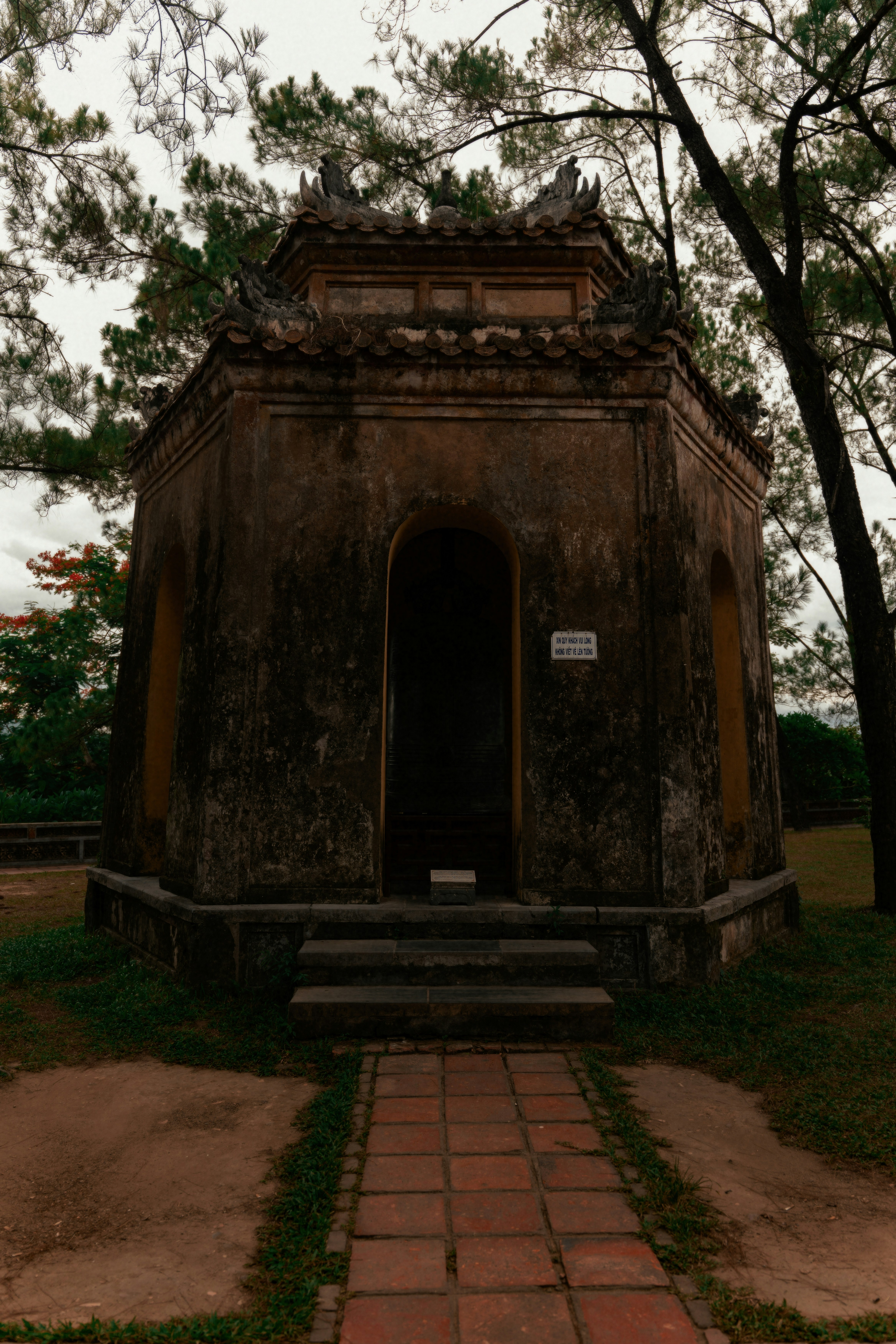 Ancient Shrine Tower in Shadowed Garden