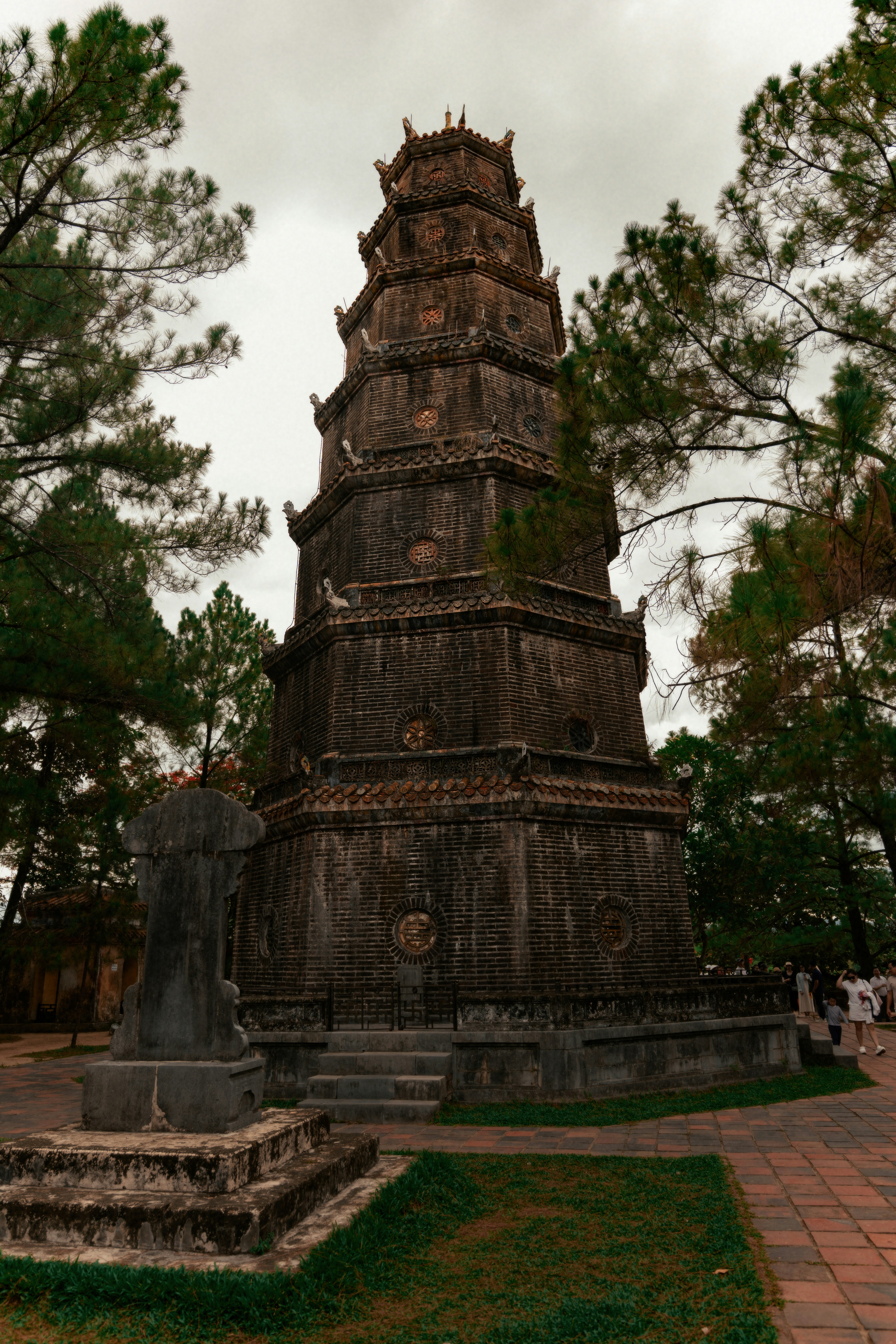 Stone Pagoda Brought to Rust by Pines: A Medieval Tower Surrounded by Silent Trees
