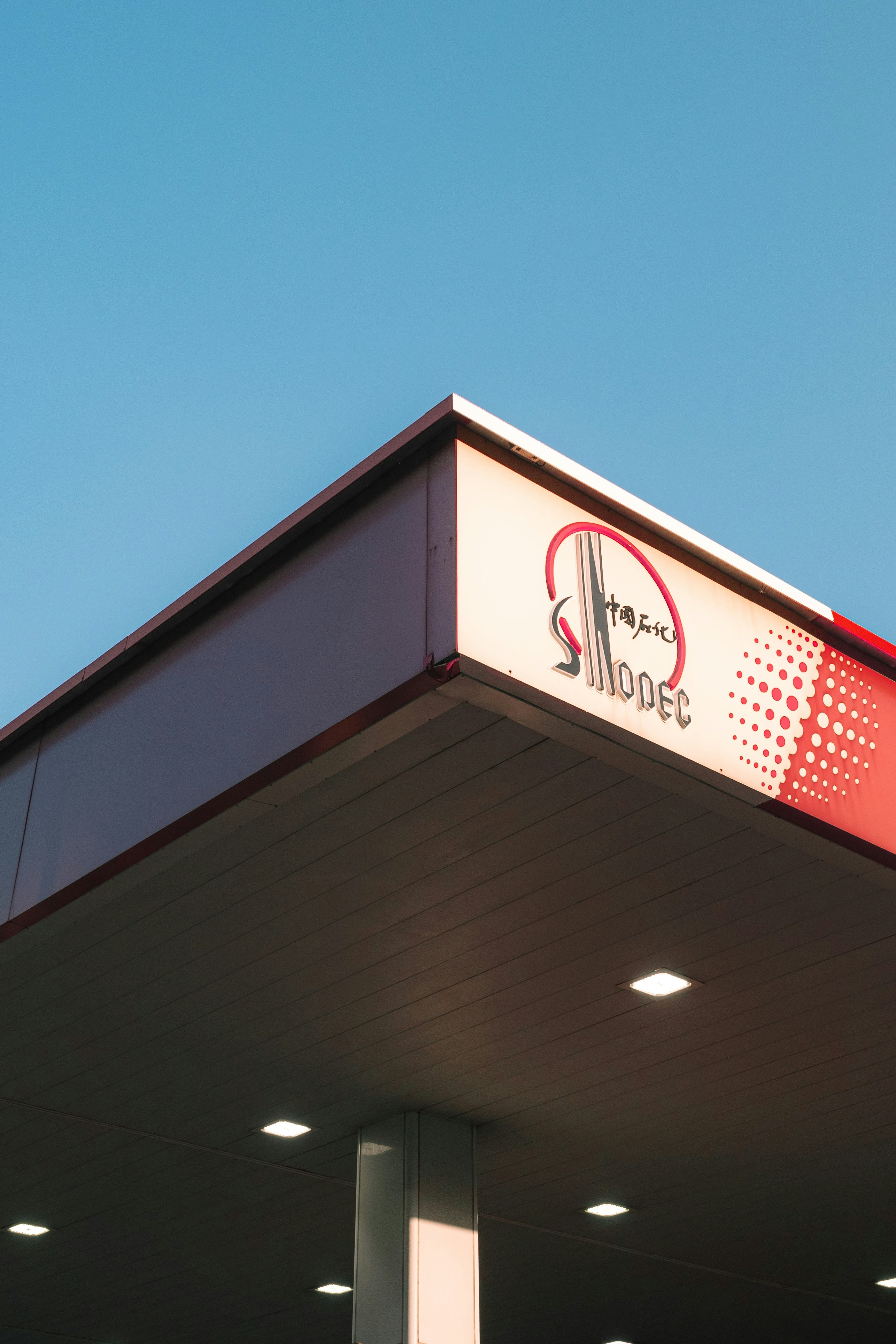 Corner of a Modern Shodec Sign: Clean Lines Under Clear Sky