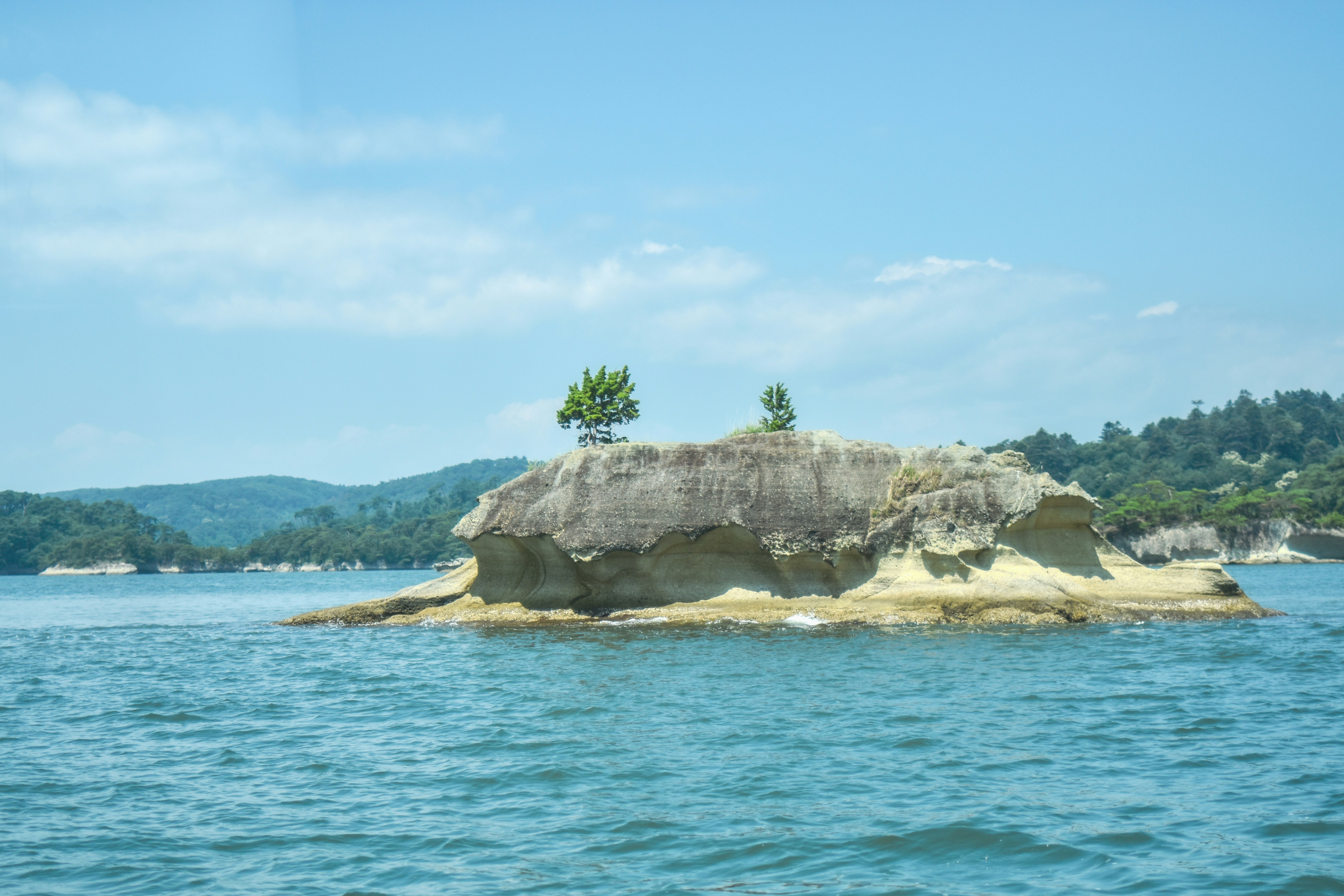 Island of Stone and Pines: A Quiet Sea Breaks Upon a Tertiary Shore