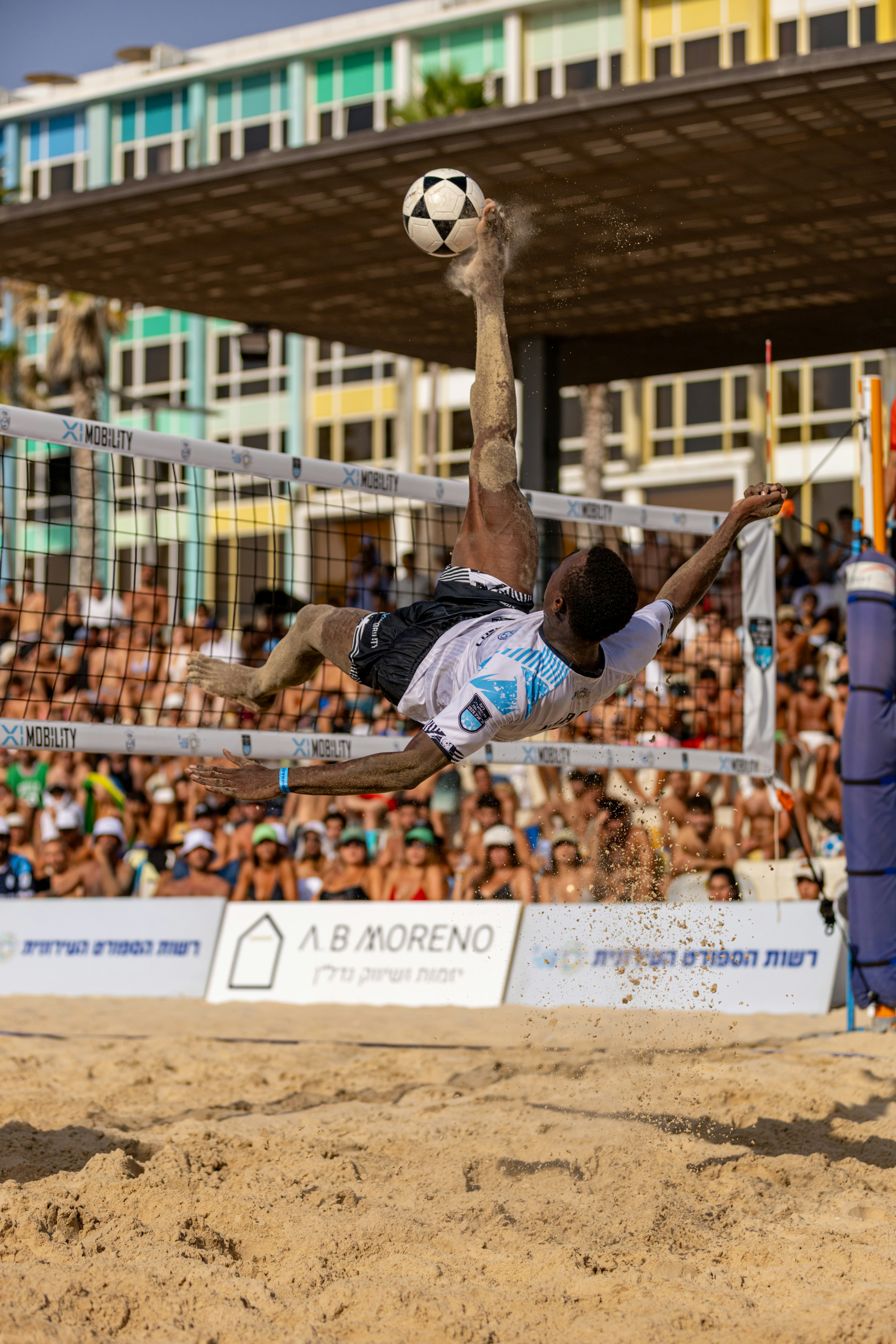 Aerial Spike: Beach Volley Jump Over the Net