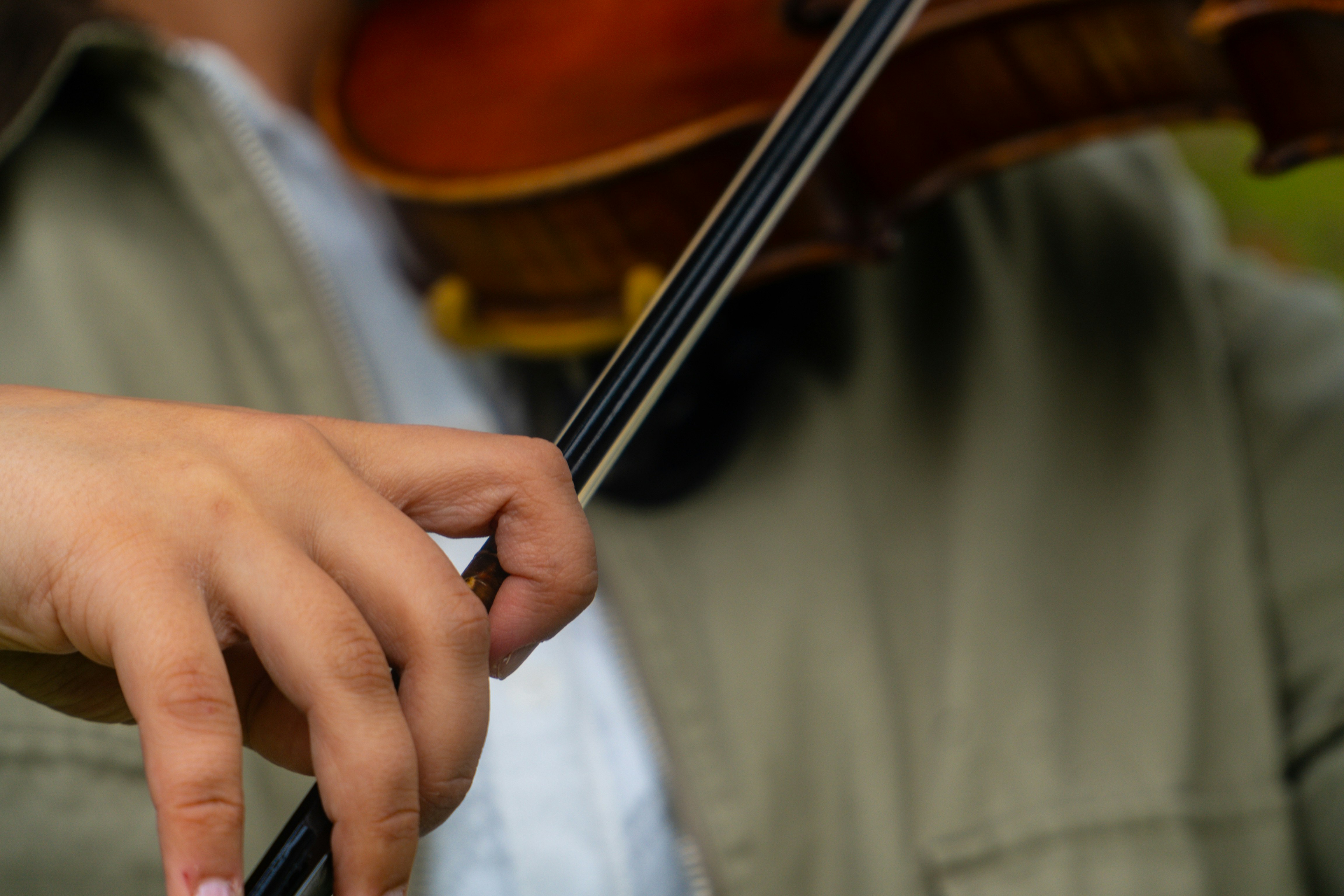 Strings, Spark, and Silence: Close-Up of a Violinist's Gesture