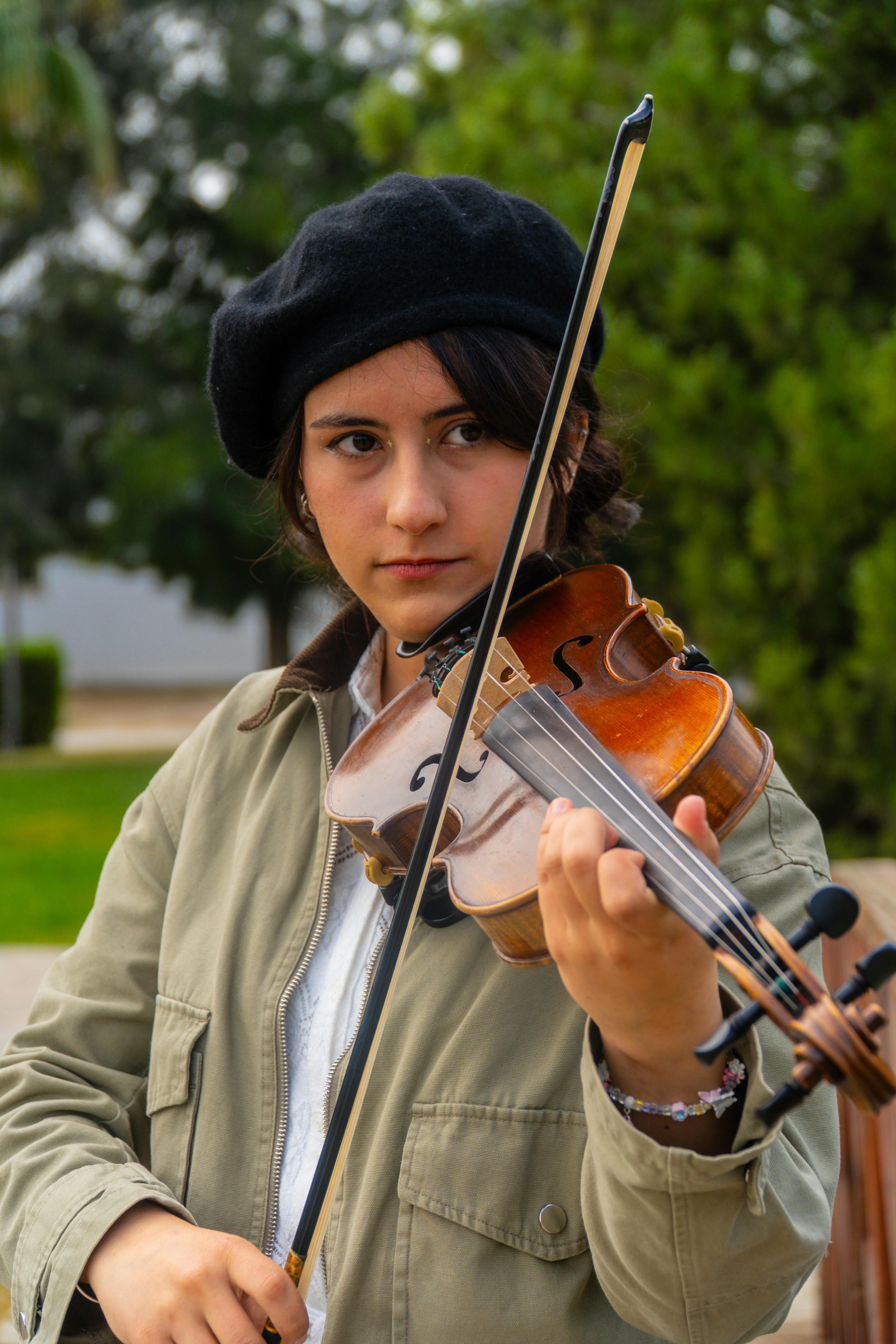 Portrait of a Violinist in Olive Jacket Under a Beret