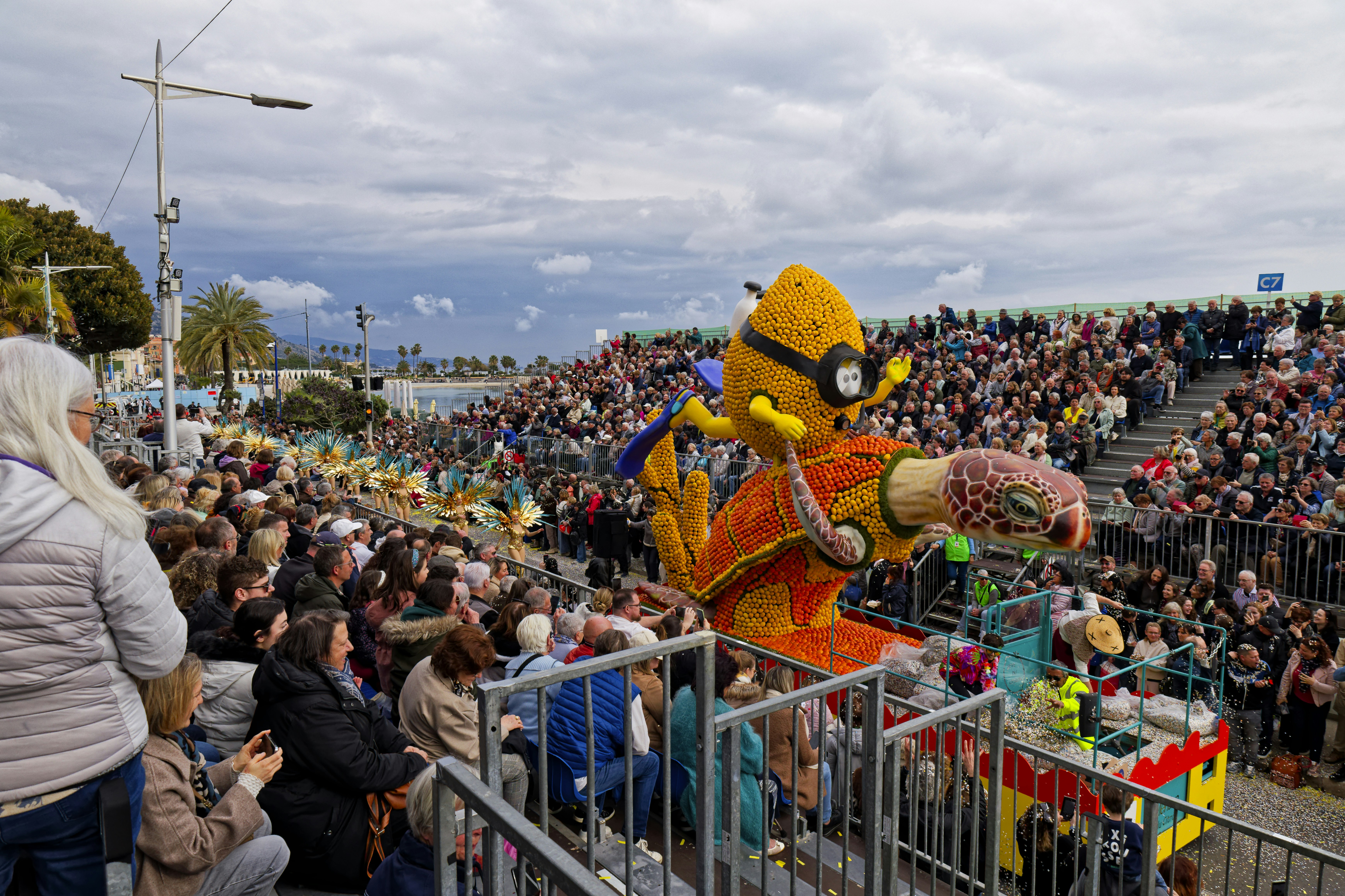 Midsummer Parade Giant: A Colorful Minion on the Seafront Stage
