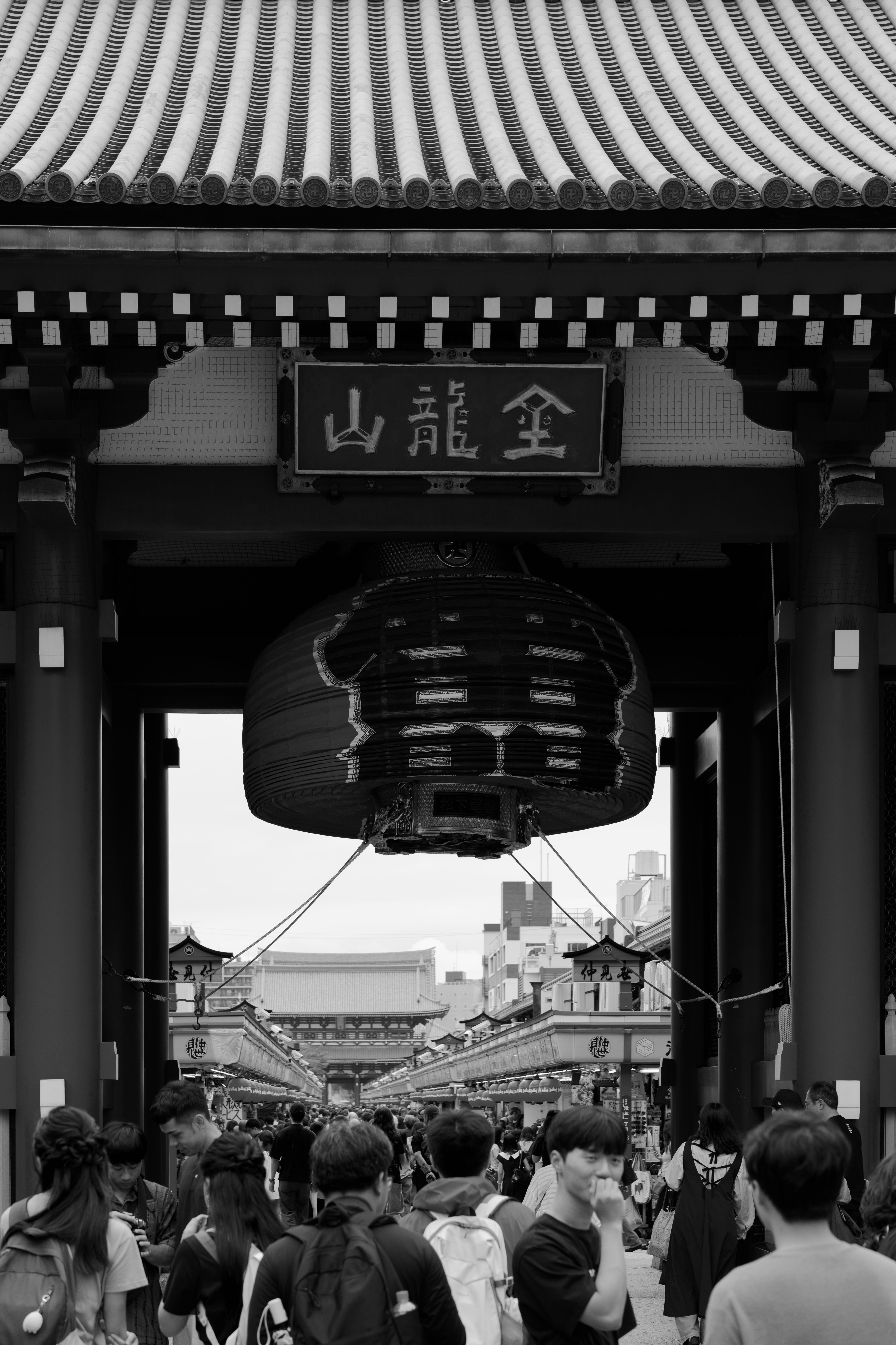 Lantern Gate Reverie: Quiet Crowd Beneath a Sacred Lantern