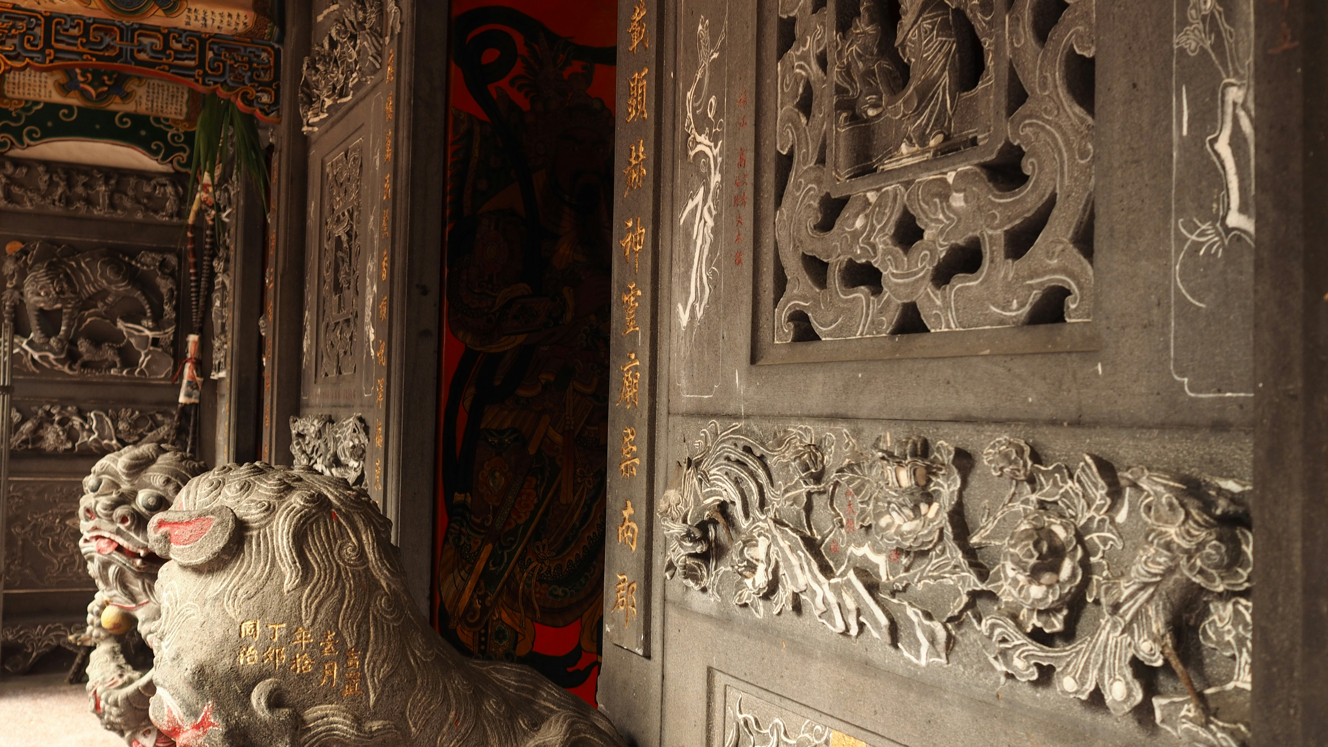 Dragon-carved doorway at the temple threshold