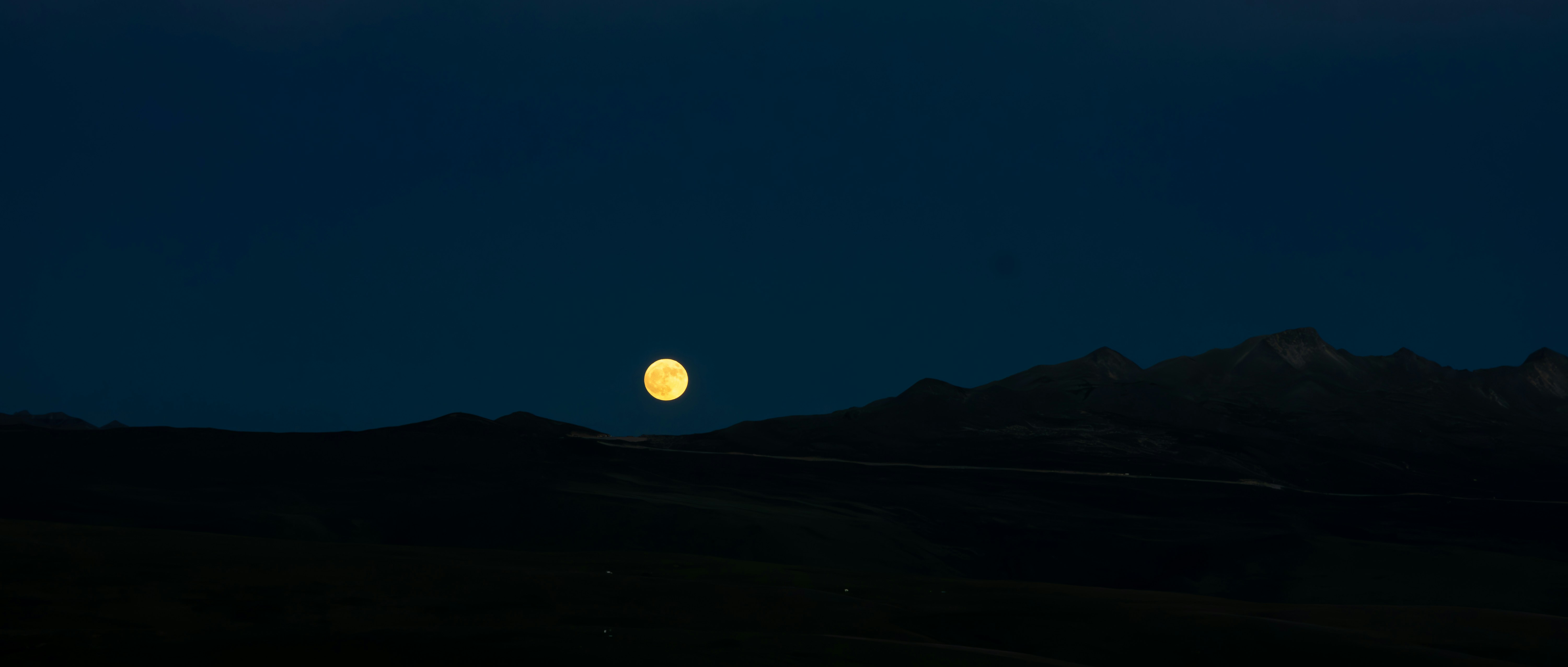 Moonrise Over Silent Ridges