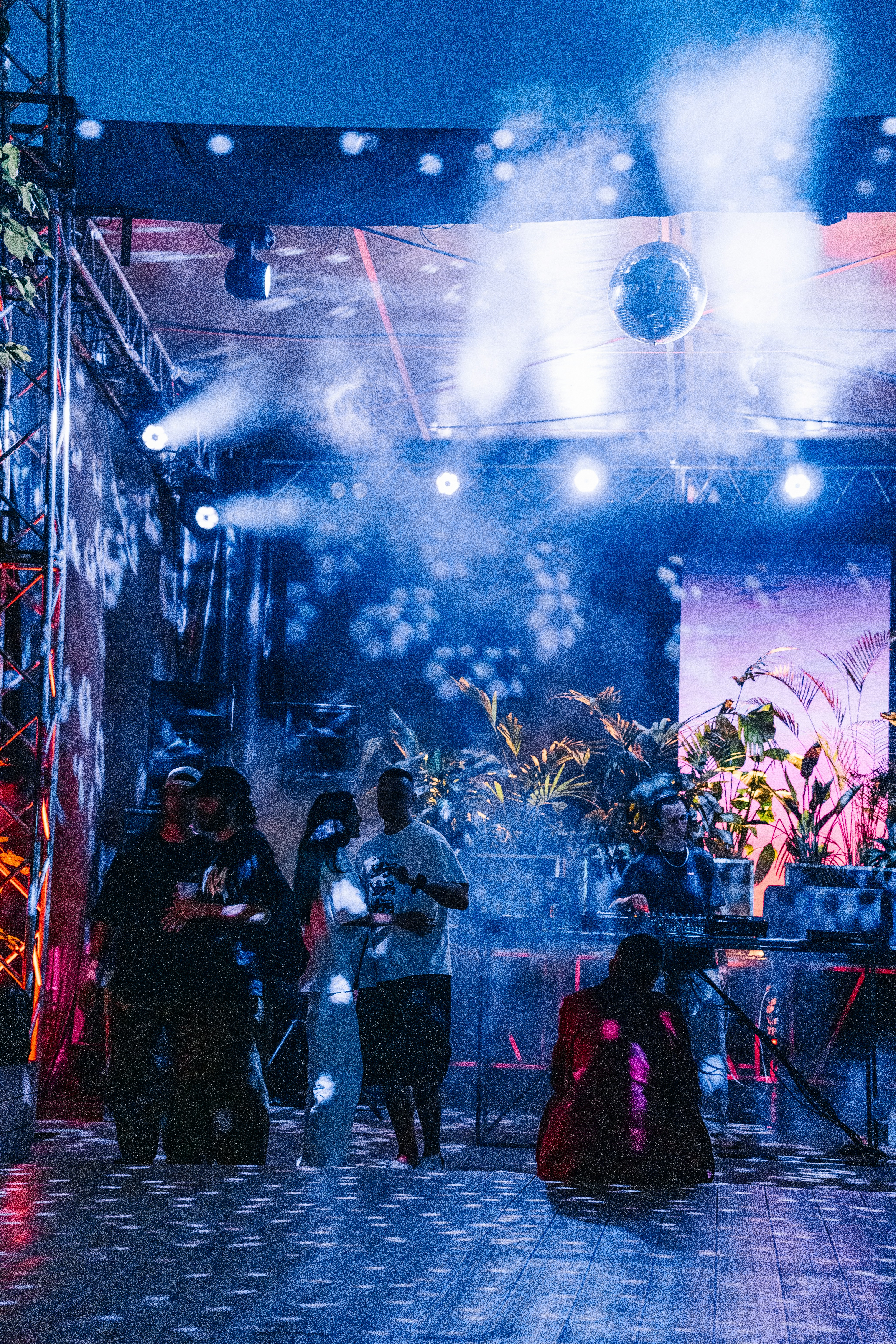 Midnight Pulse: Clubgoers and DJ in Neon-Fog Reverie