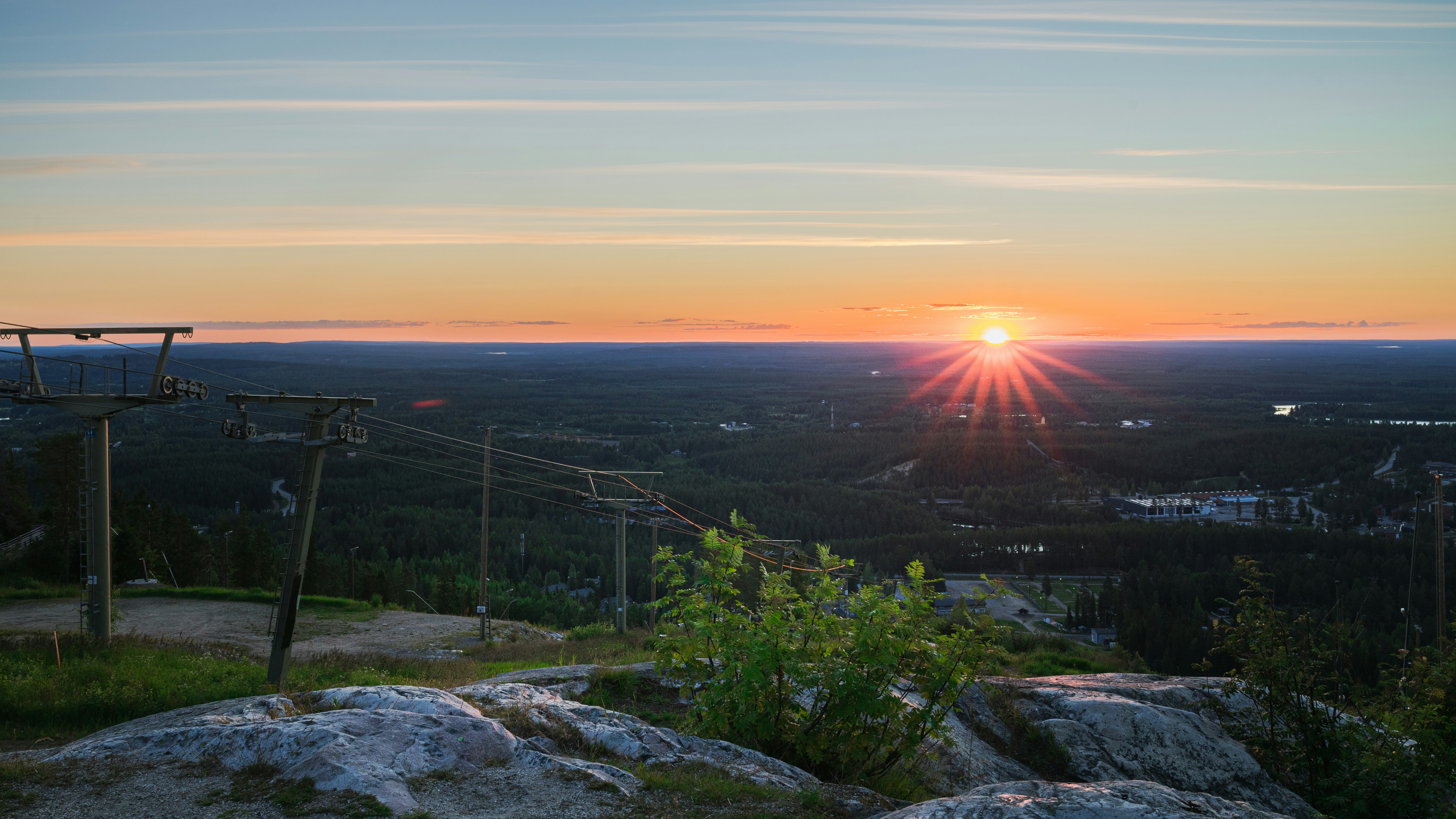 Sunrise at the Ridge: Cable Car Sleepover Over a Quiet Valley