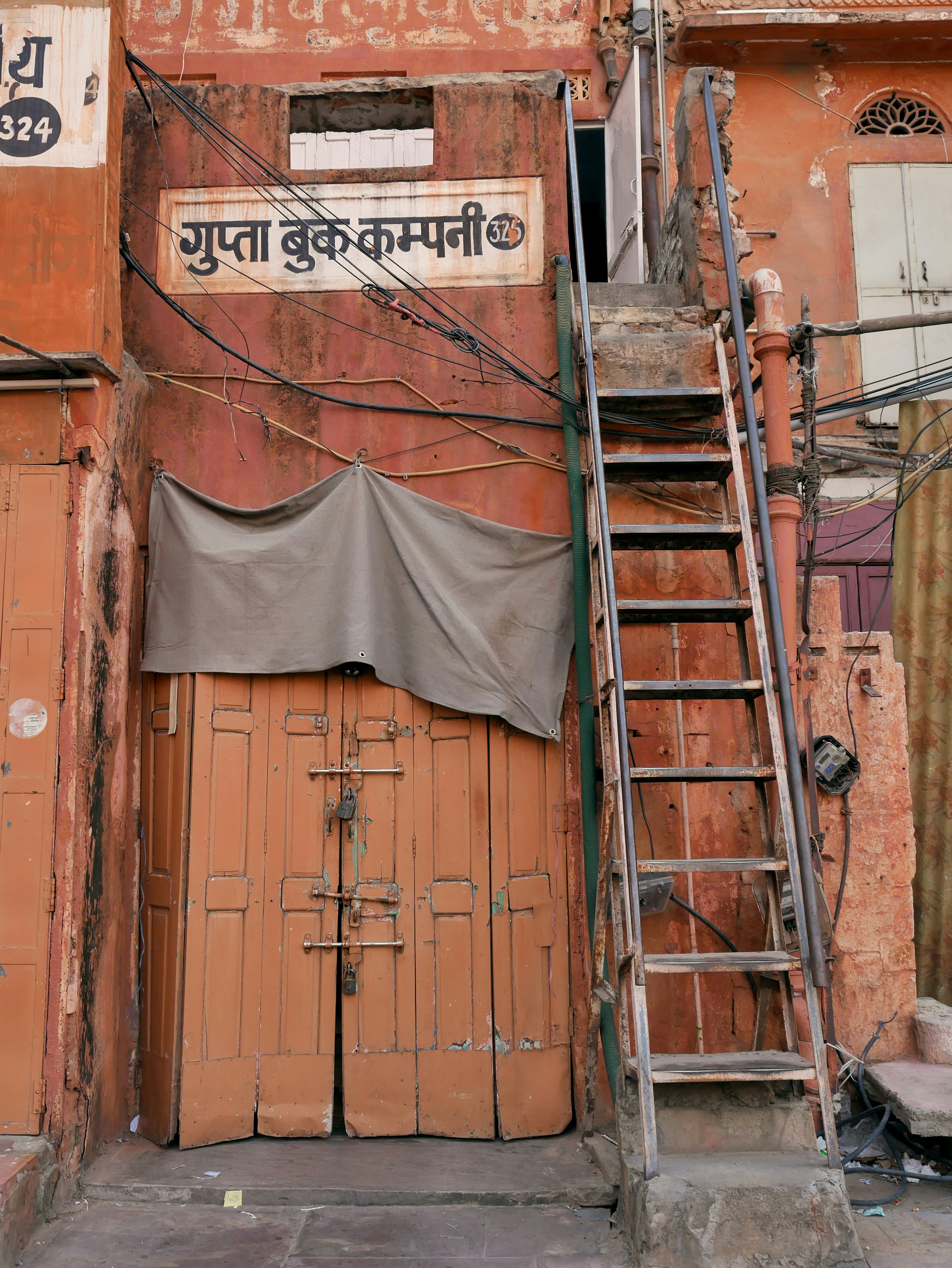 Rusted Staircase and Behind-the-Scenes Corridor
