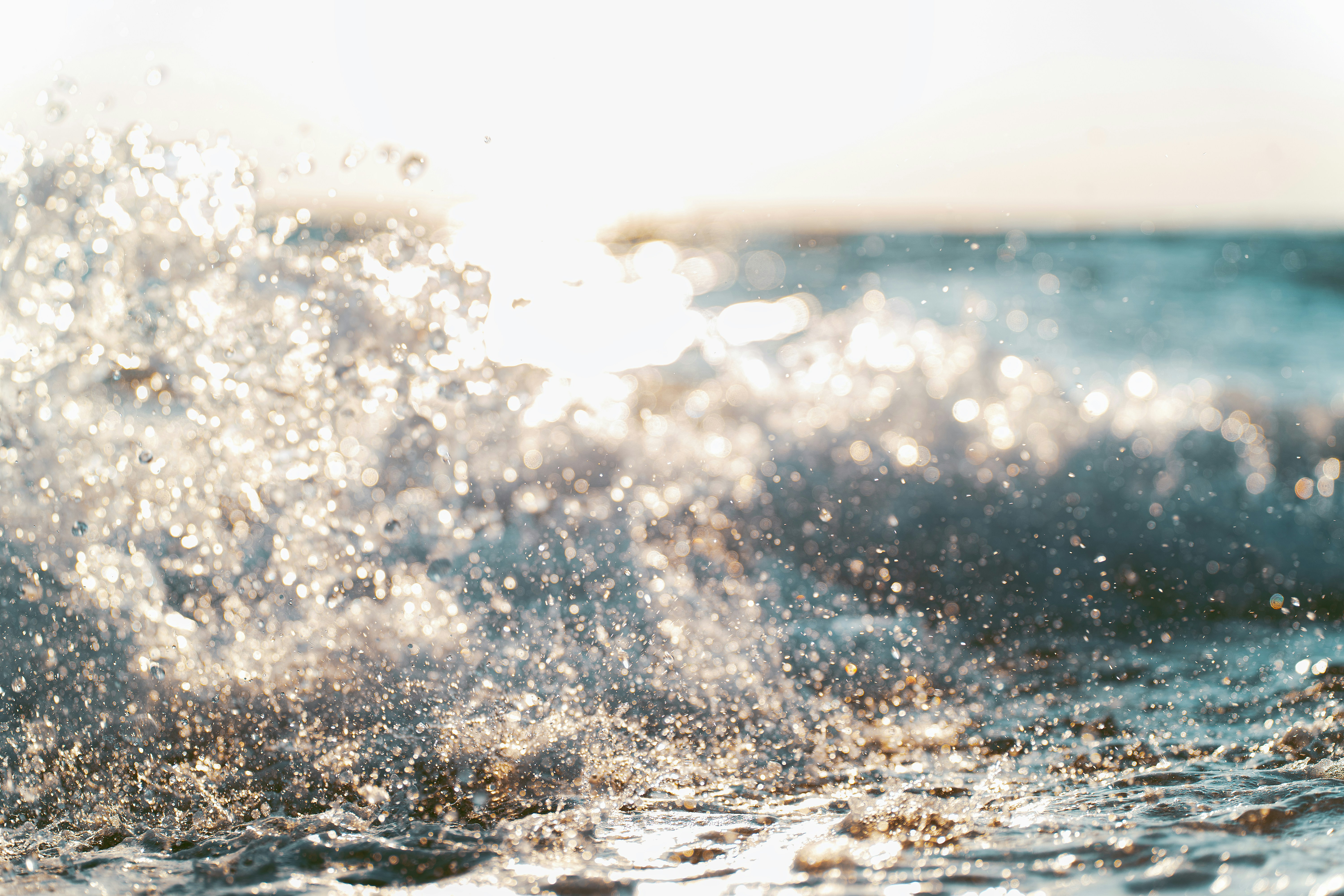 Sunlit Sea Spray: A Moment of Turbulent Glow