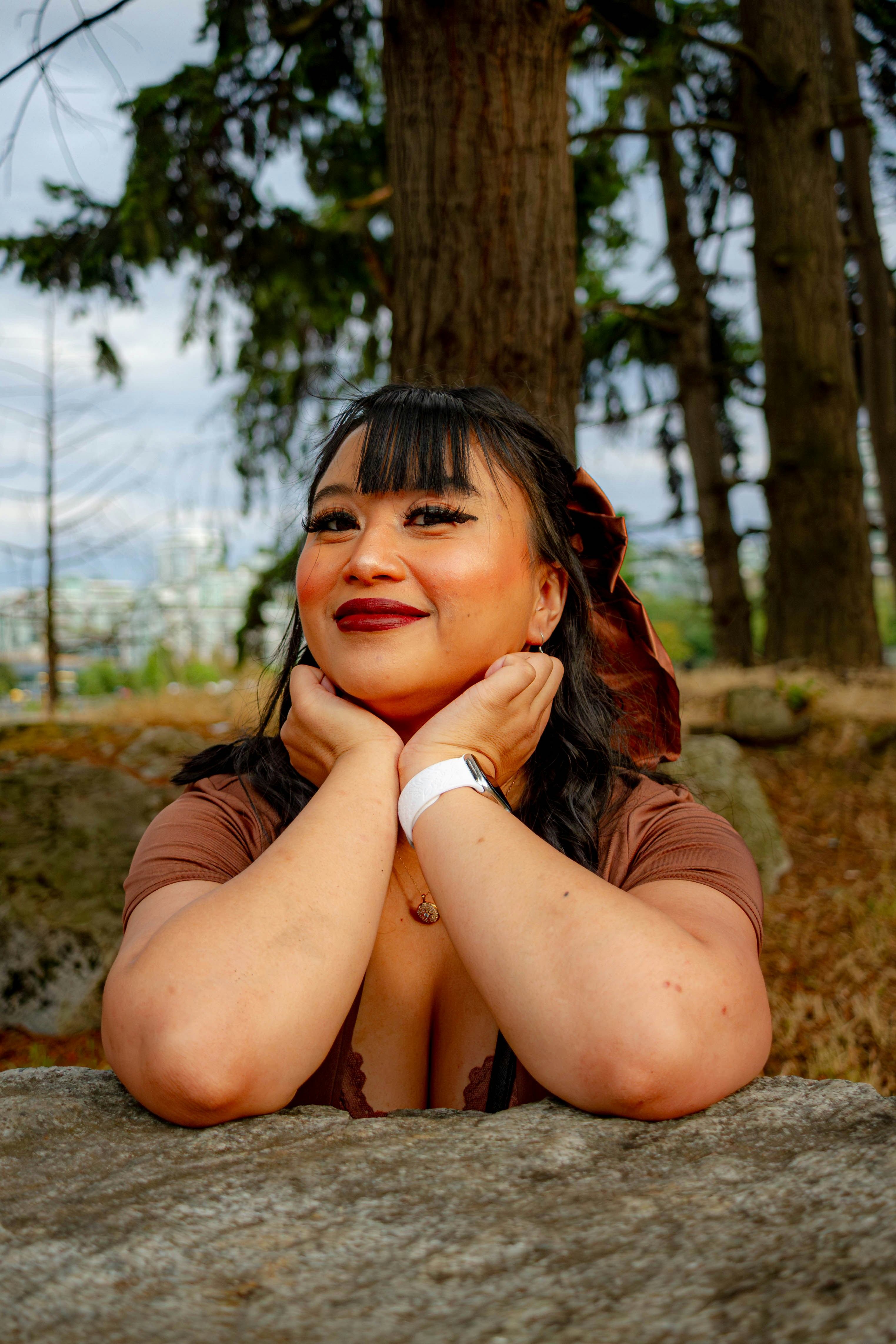 Warm Confident Smile Under Forest Light