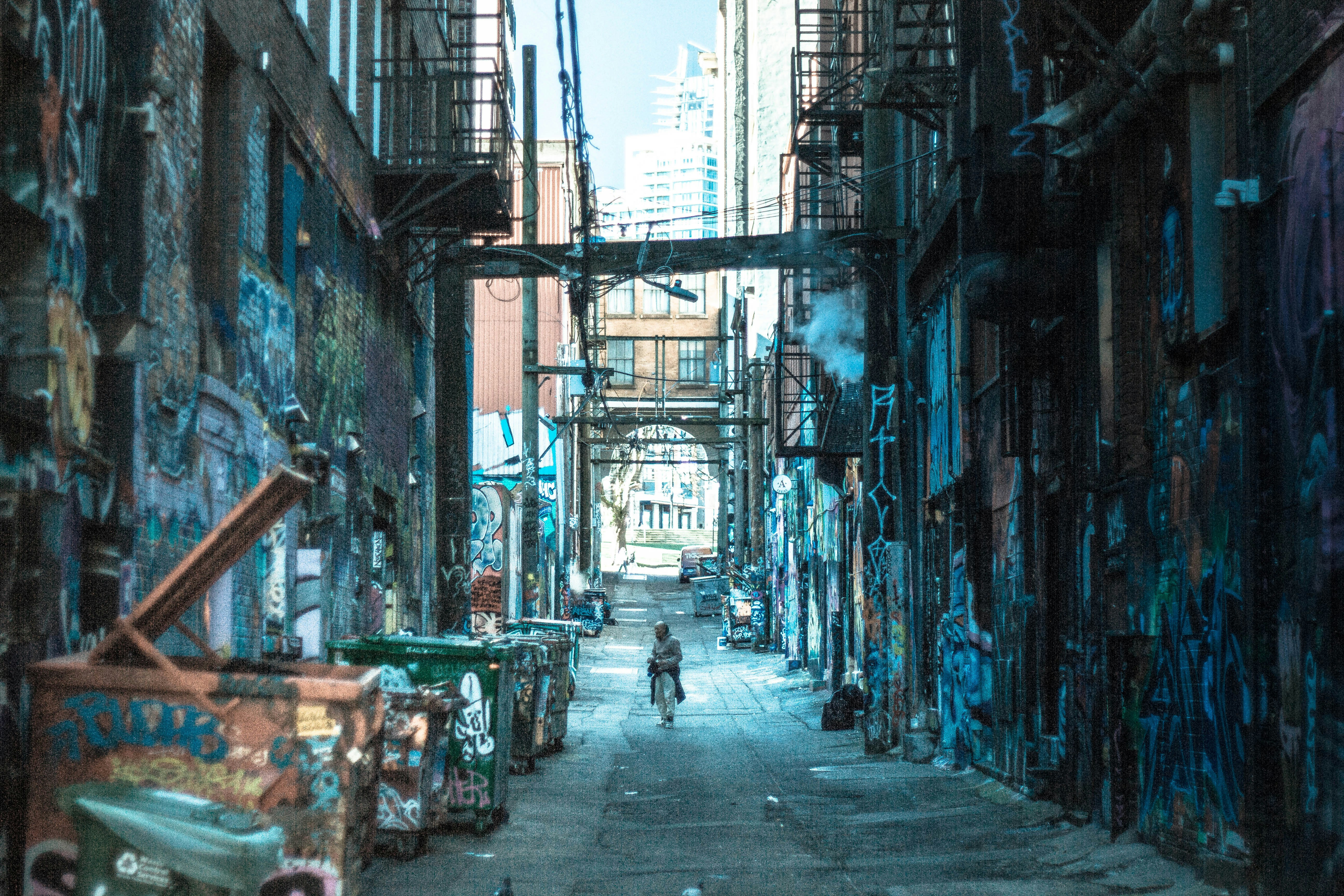Alleyway Convergence: Lone Rider Toward the Distant Light