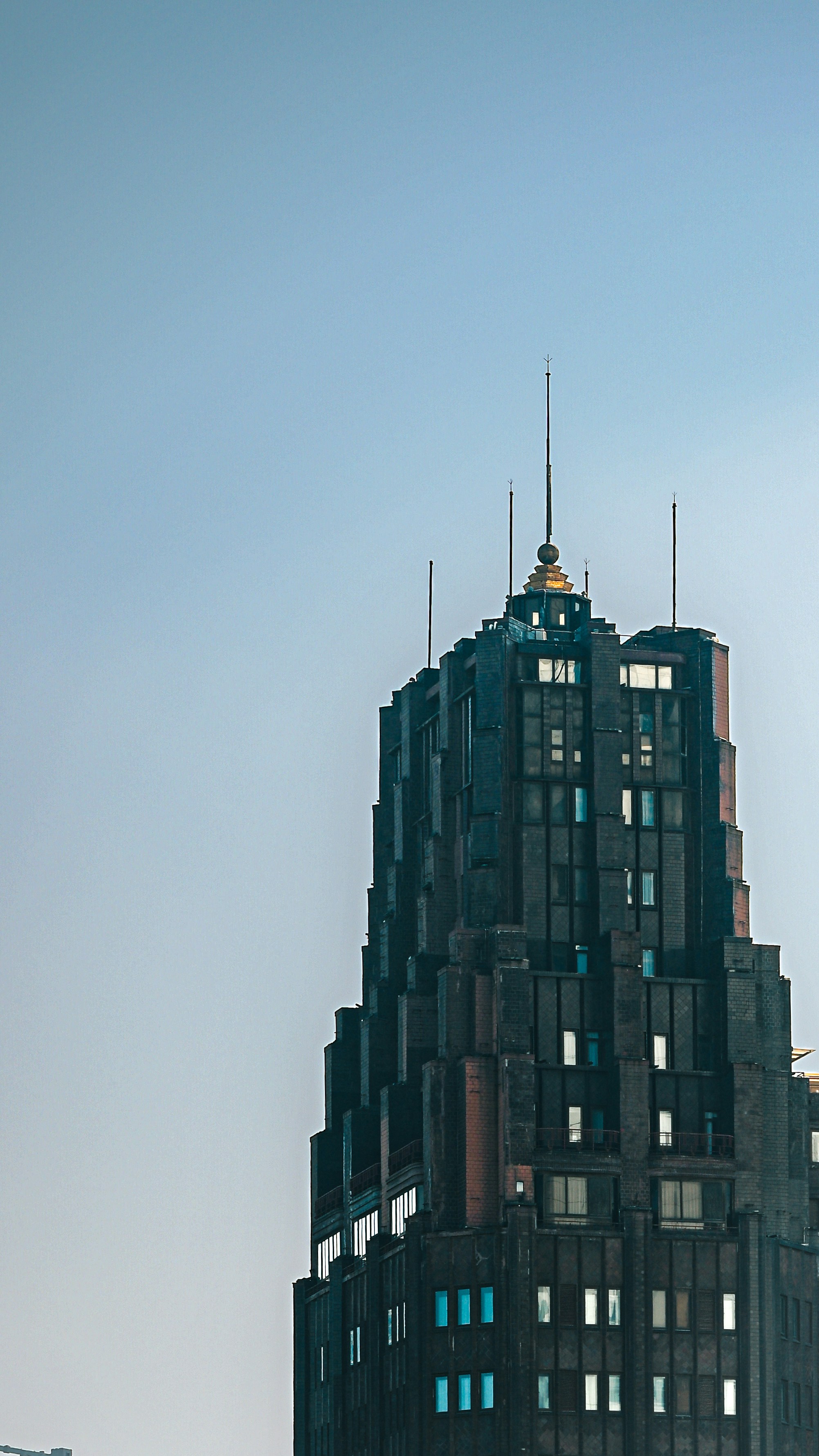 Skyline Sentinel: A Tower Reaching Toward the Clear Blue