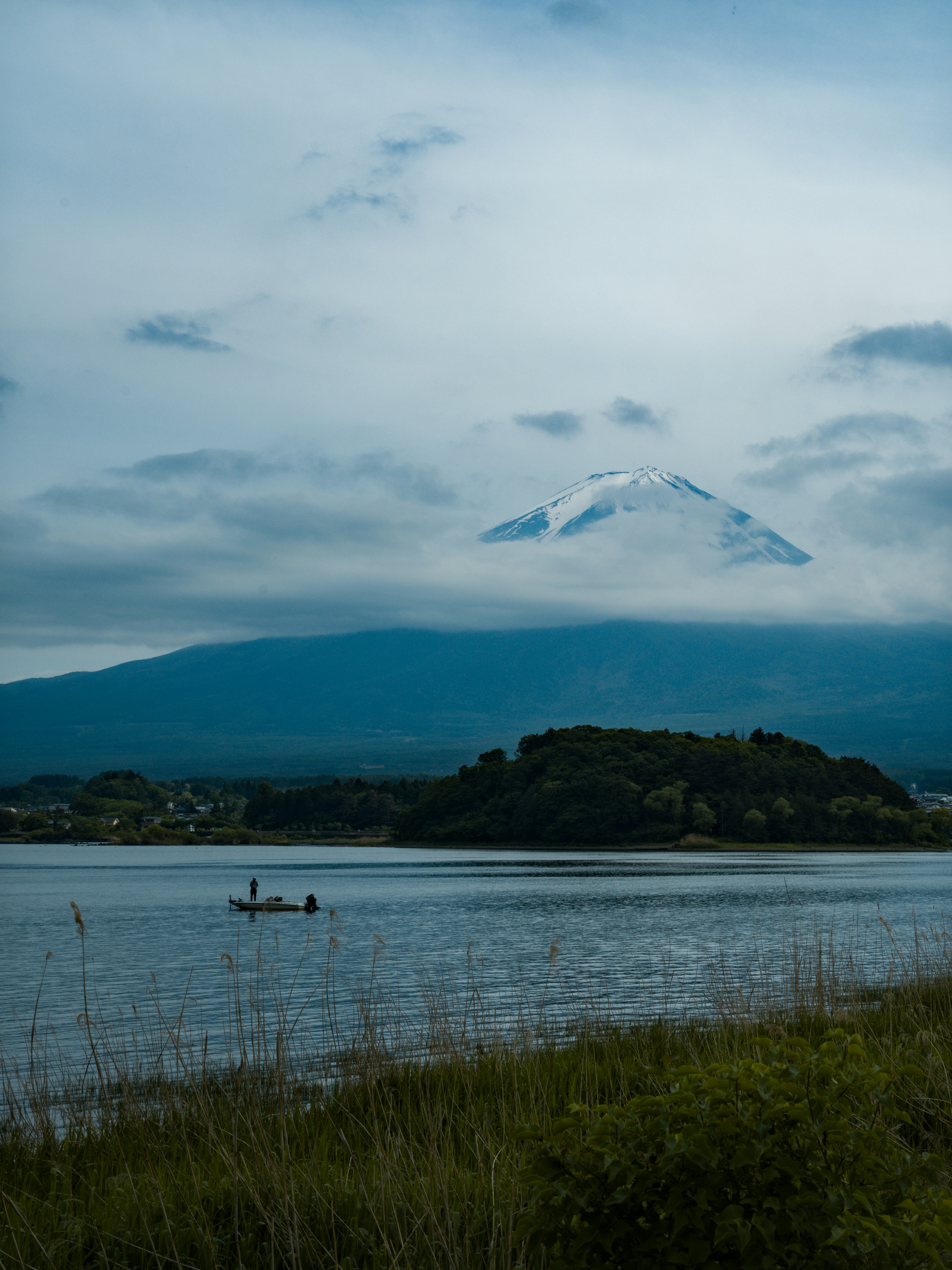 Mt. Fuji Afloat: Snow Peak Above a Quiet Coastal Scene