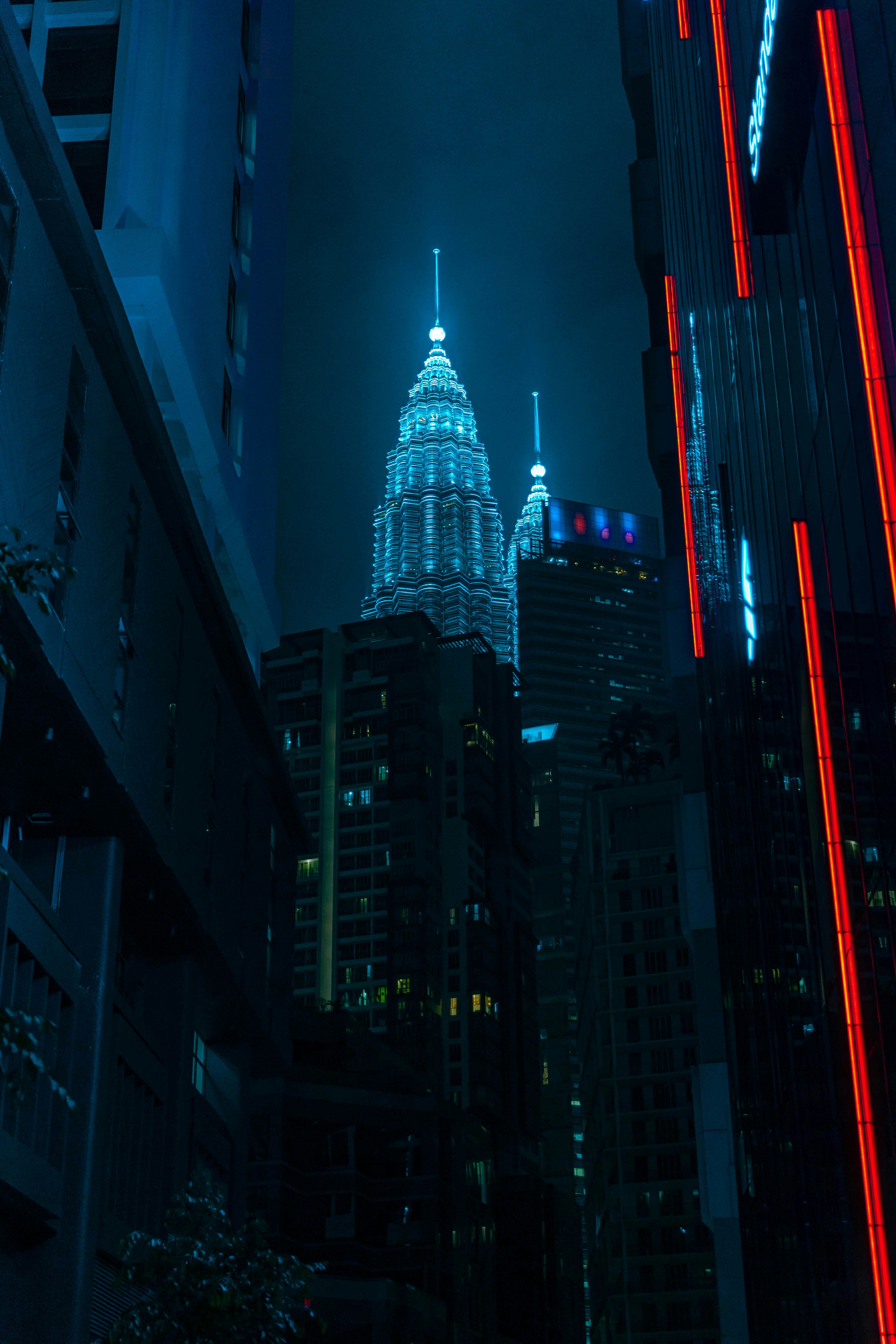 Neon Needlerise: Kuala Lumpur’s Twin Spires in Night Blue