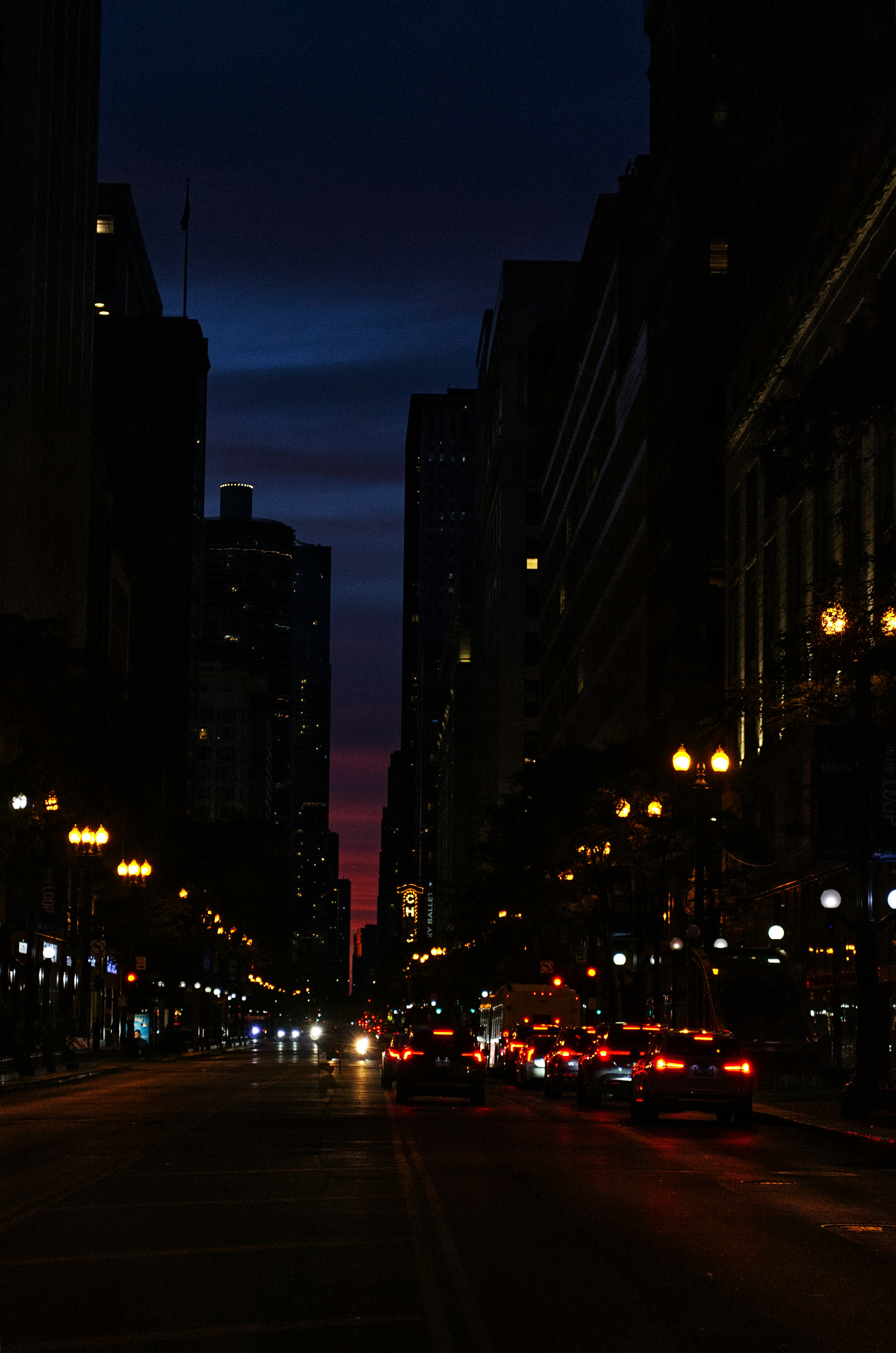 Midnight Boulevard: Neon Echoes Between Tall Facades