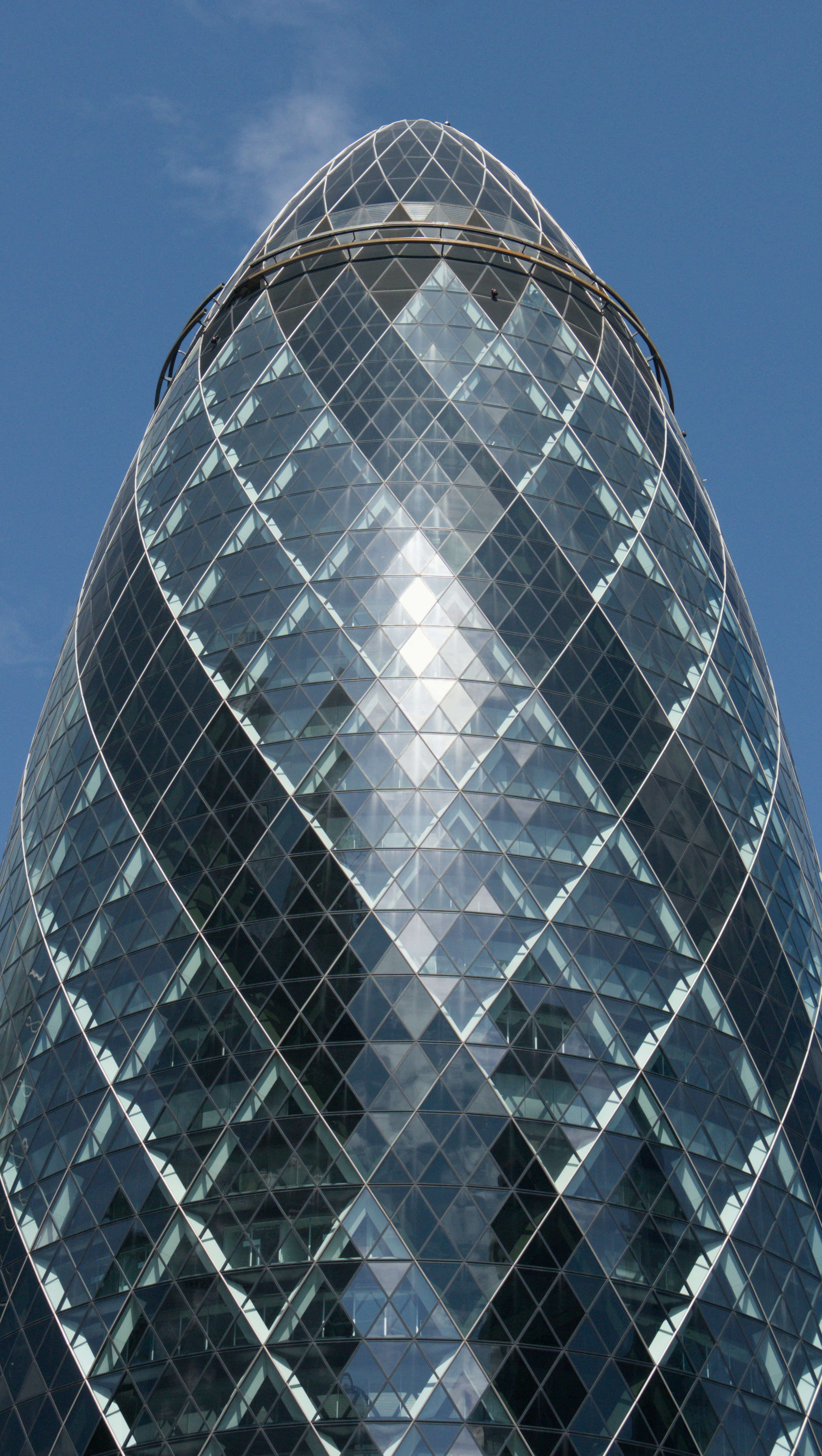 Vertical Prism: Gherkin-like Glass Facade Reaching the Sky